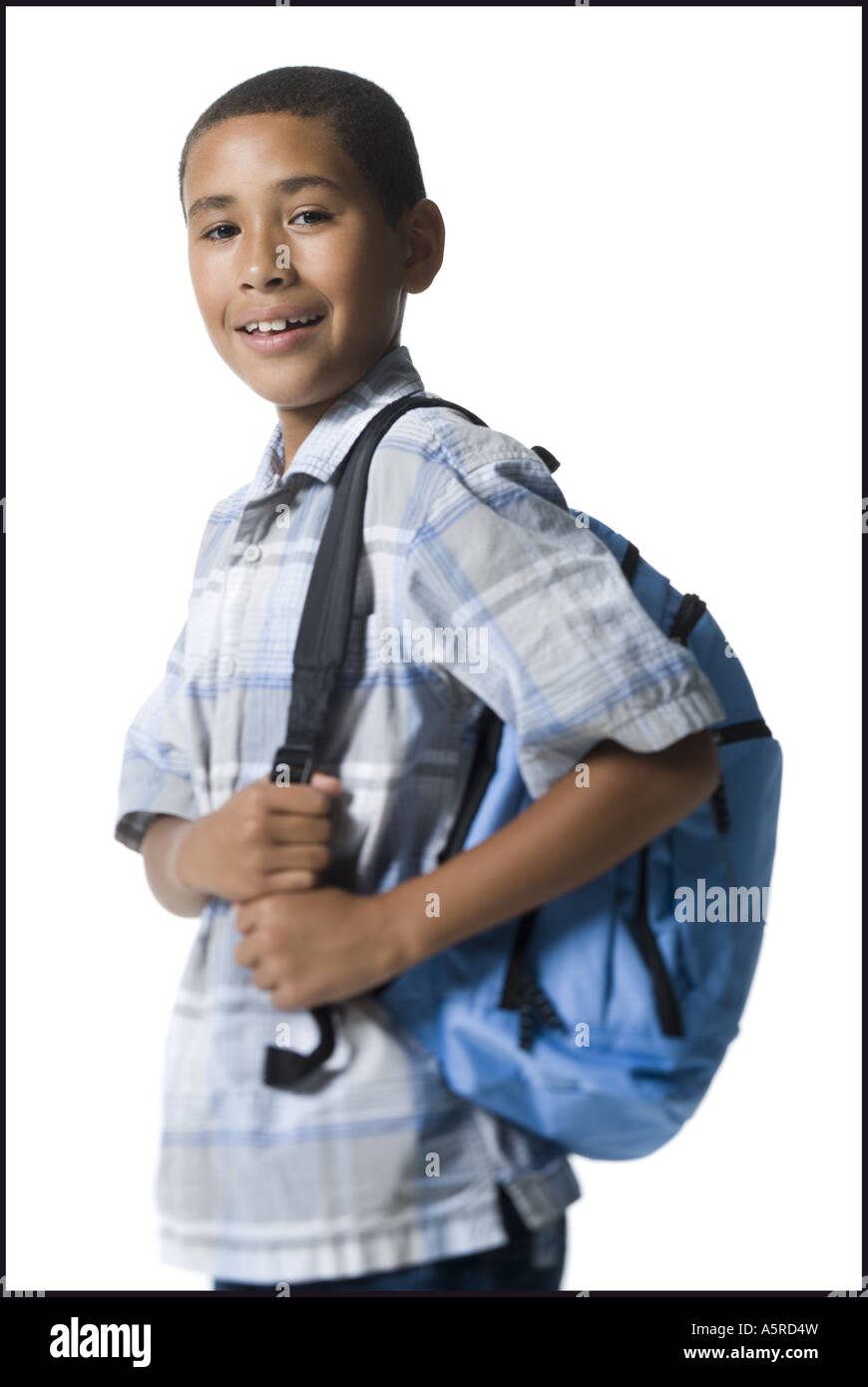 Portrait of a smiling boy with a backpack Stock Photo - Alamy