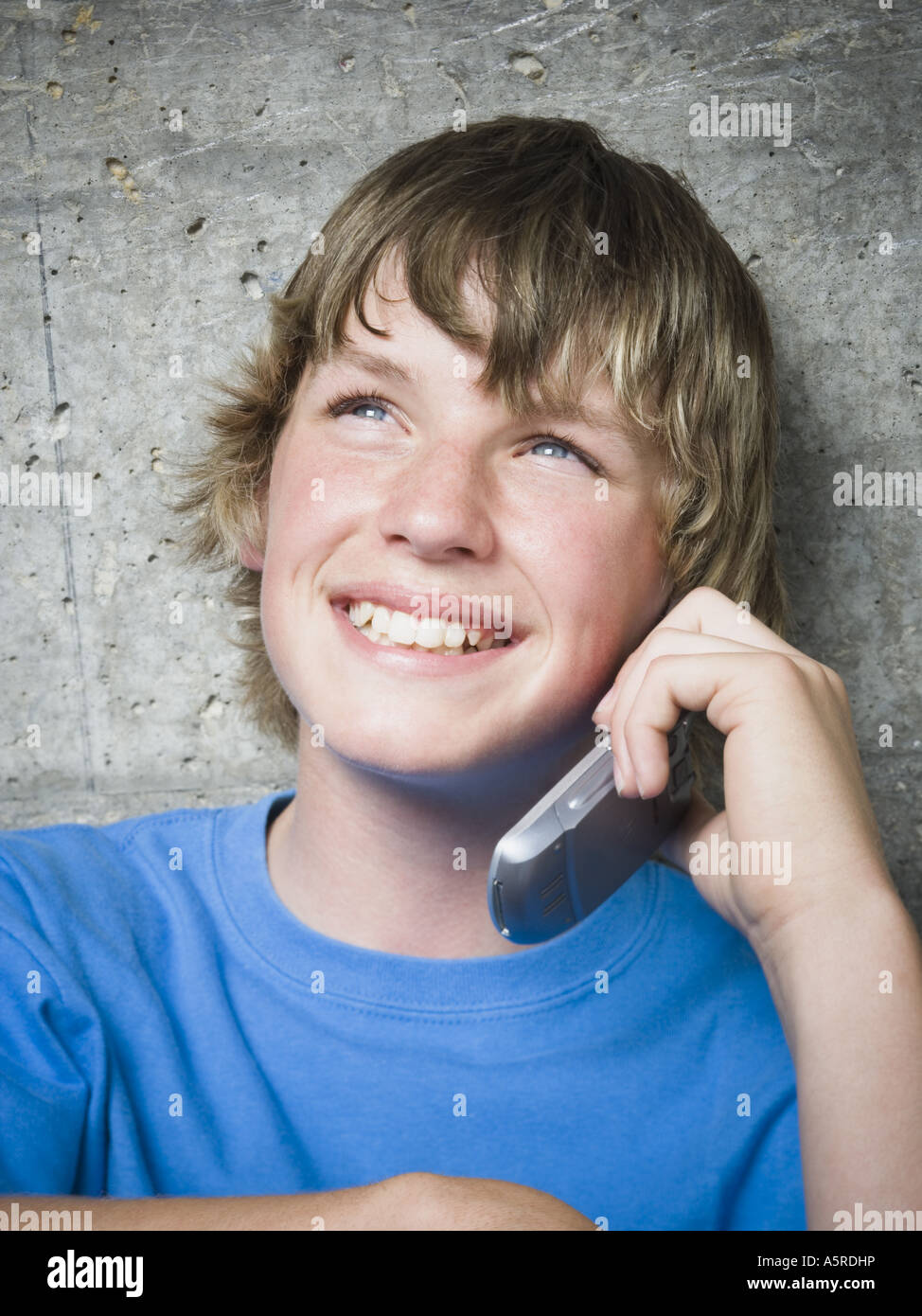 Portrait of a teenage boy using a mobile phone Stock Photo - Alamy
