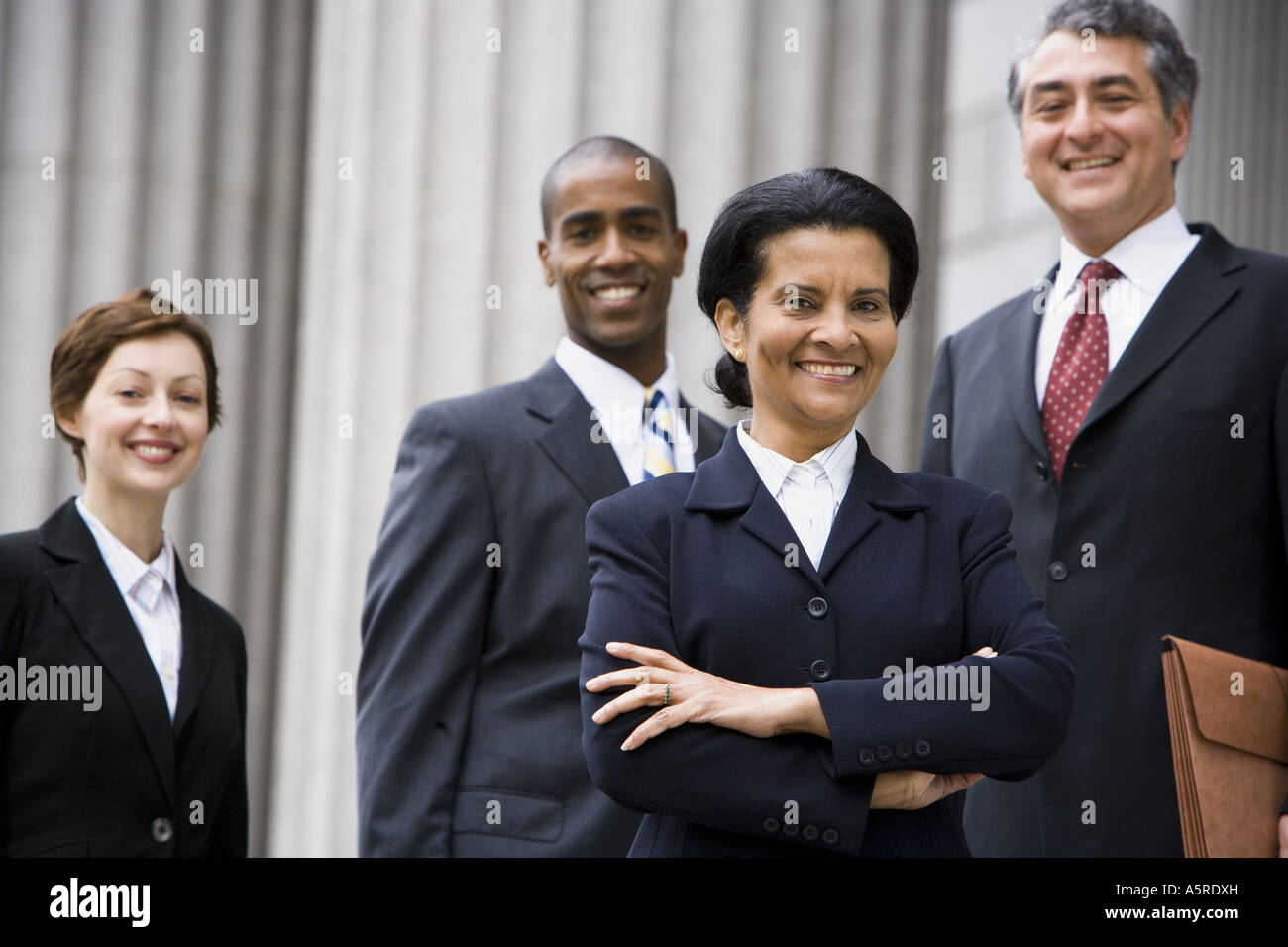 Portrait of lawyers smiling in front of a courthouse Stock Photo - Alamy