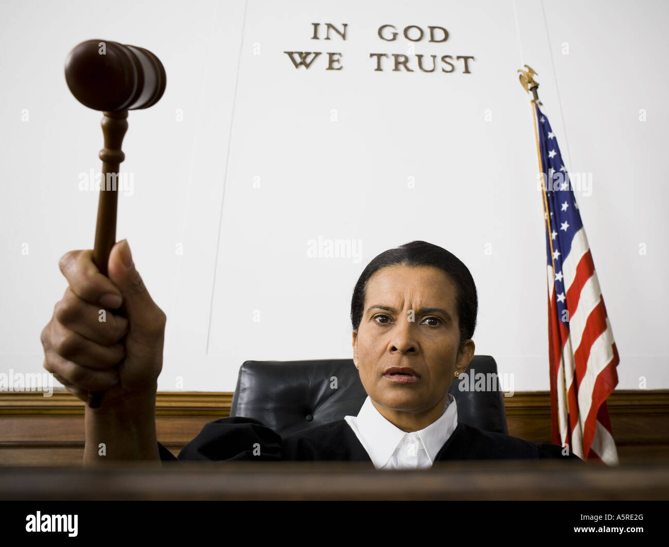 Portrait of a female judge holding a gavel Stock Photo - Alamy