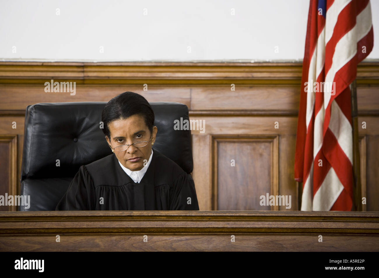 Portrait of a female judge holding a gavel Stock Photo - Alamy
