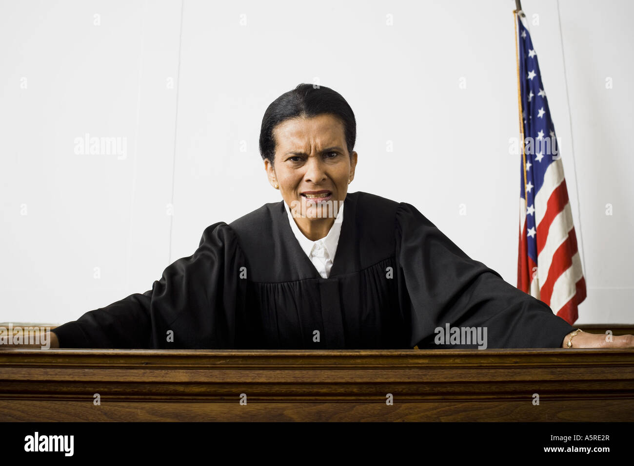 Portrait of a female judge holding a gavel Stock Photo - Alamy