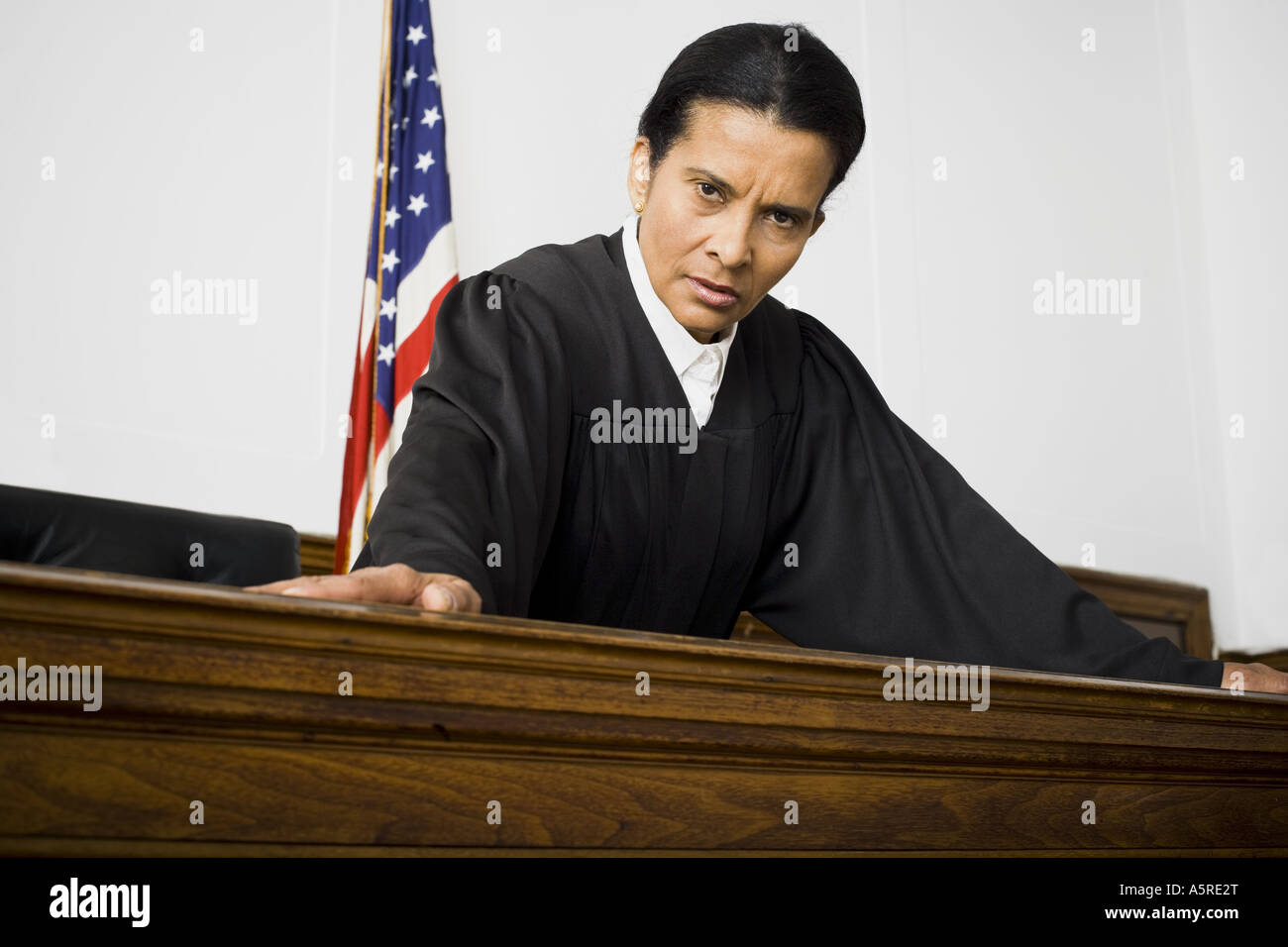 Portrait of a female judge holding a gavel Stock Photo - Alamy