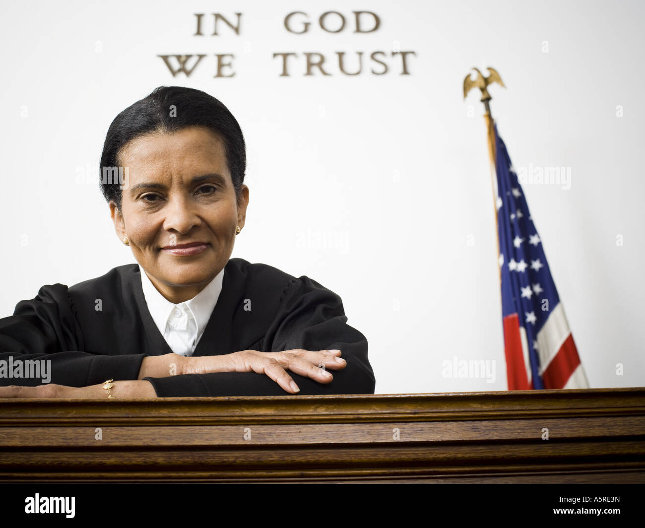 Portrait of a female judge smiling Stock Photo - Alamy