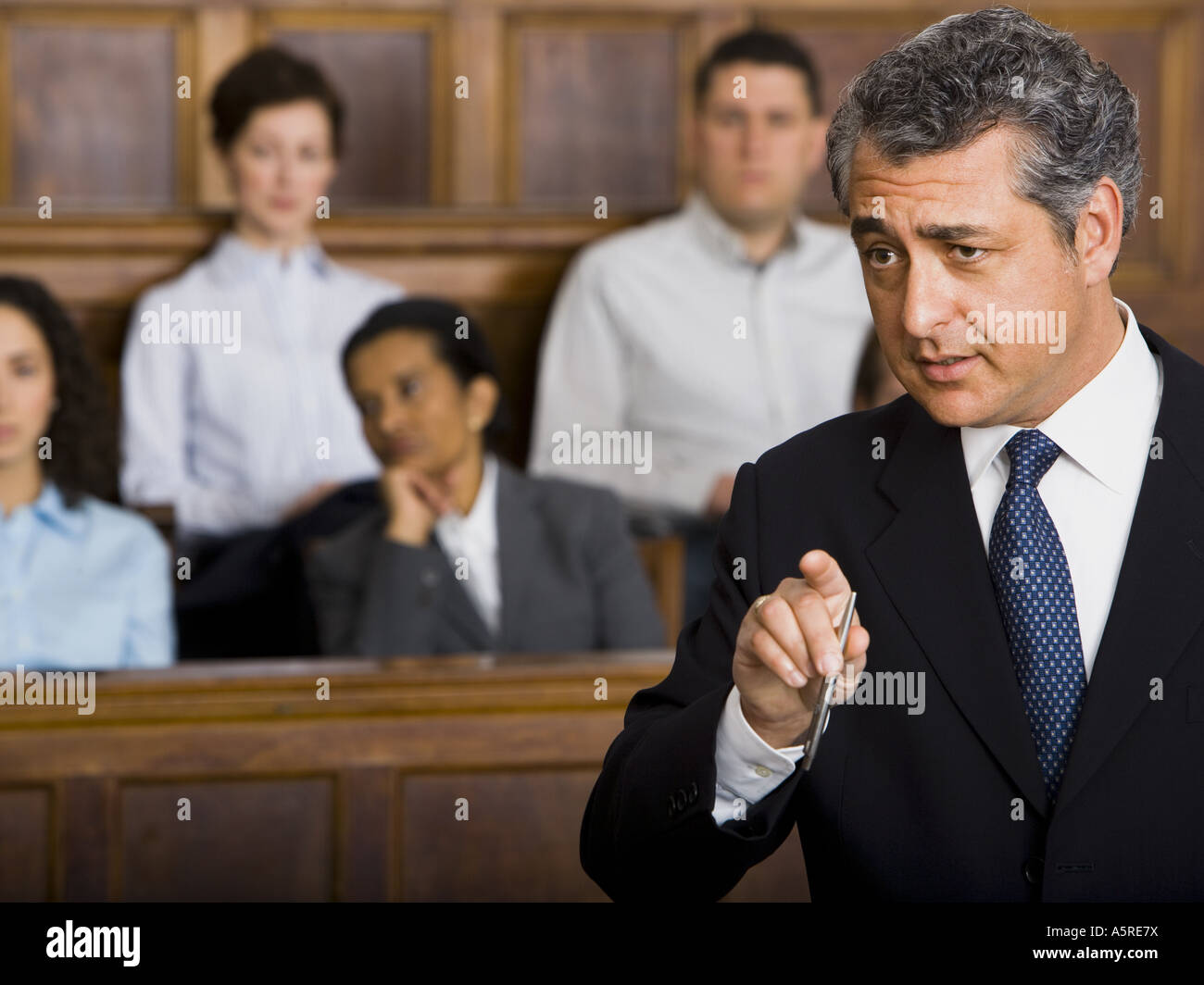 A male lawyer talking in a courtroom Stock Photo - Alamy
