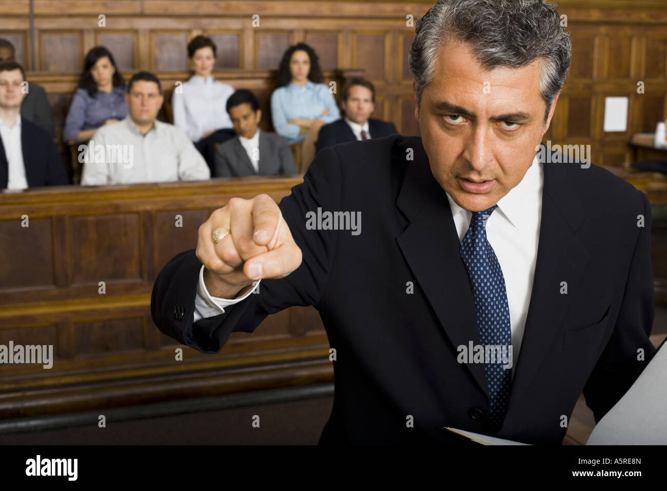 Portrait of a male lawyer pointing Stock Photo - Alamy