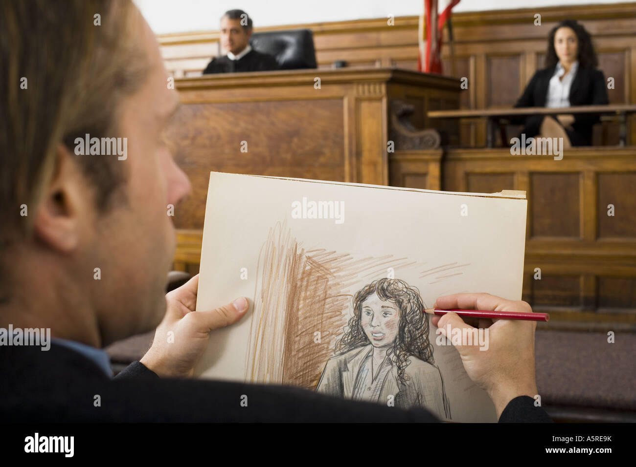 Close up of a man drawing a sketch of a witness in a courtroom Stock ...