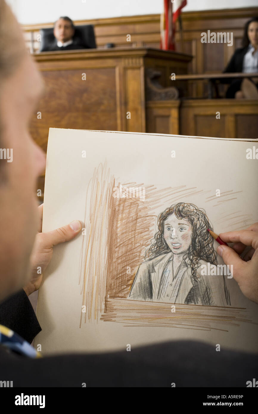 Close up of a man drawing a sketch of a witness in a courtroom Stock ...