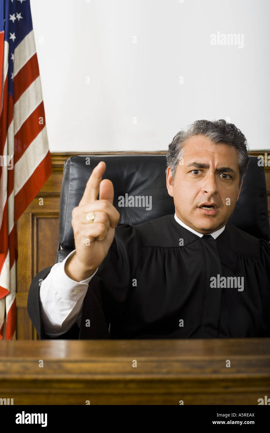 Mature male judge sitting hi-res stock photography and images - Alamy