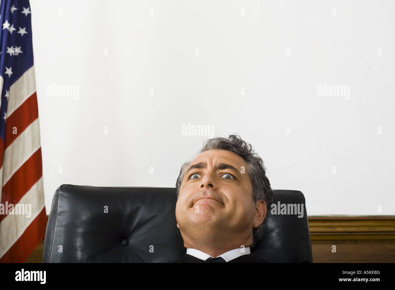 Mature male judge sitting hi-res stock photography and images - Alamy