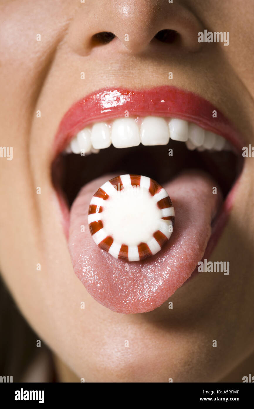 Close up young mouth candy on hi-res stock photography and images - Alamy