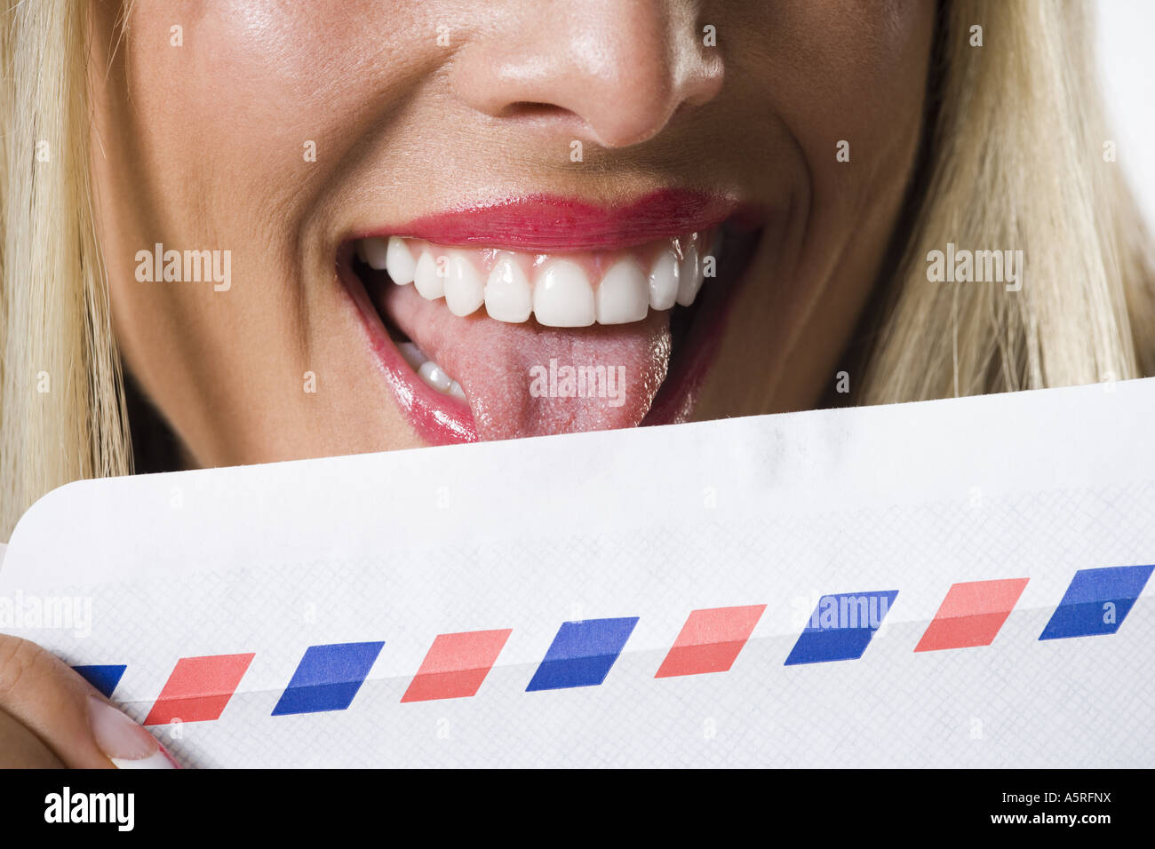 Licking envelope hi-res stock photography and images - Alamy Licking envelope hi-res stock photography and images - Alamy