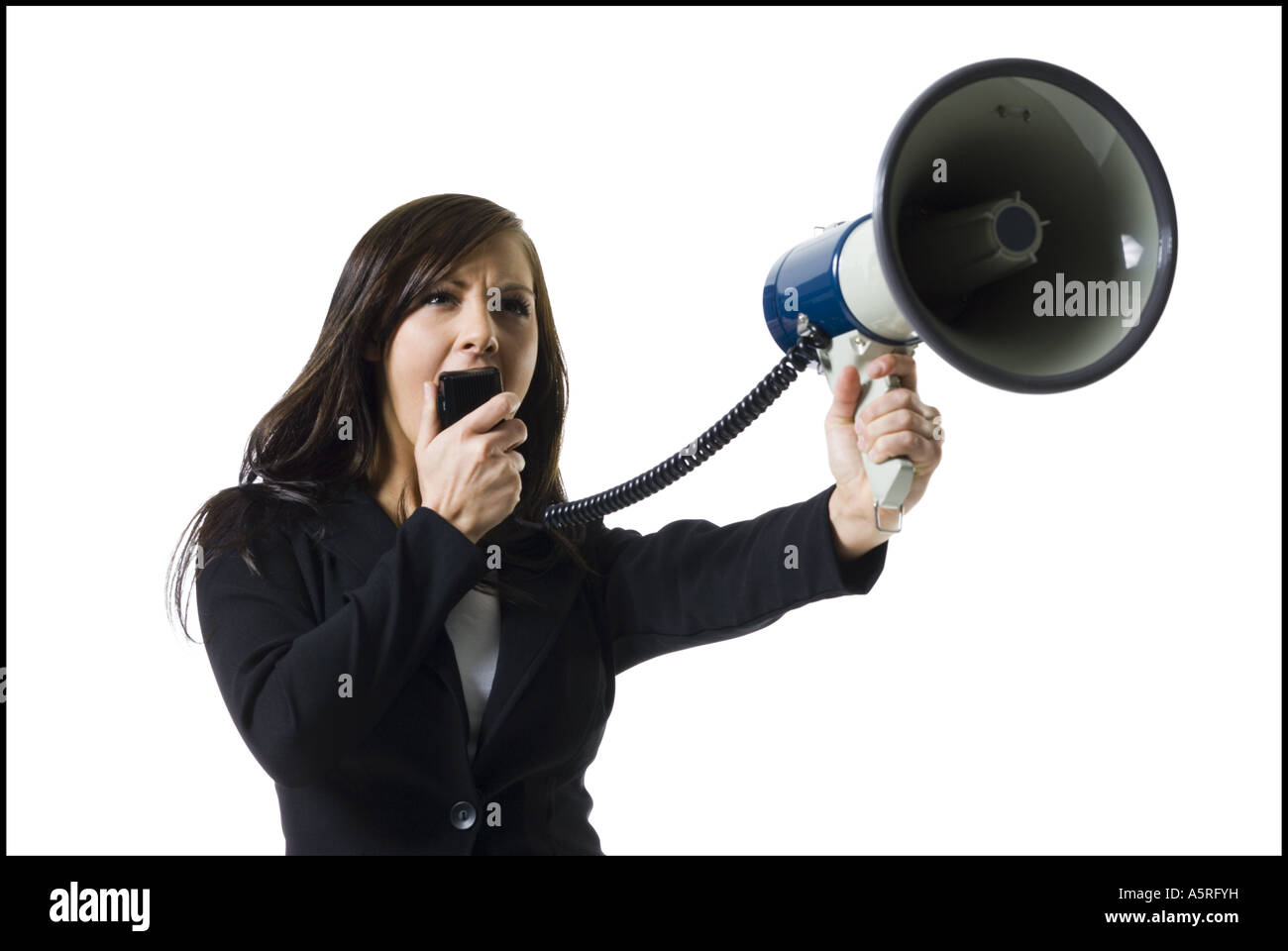 Close up of a teenage girl shouting into a megaphone Stock Photo - Alamy