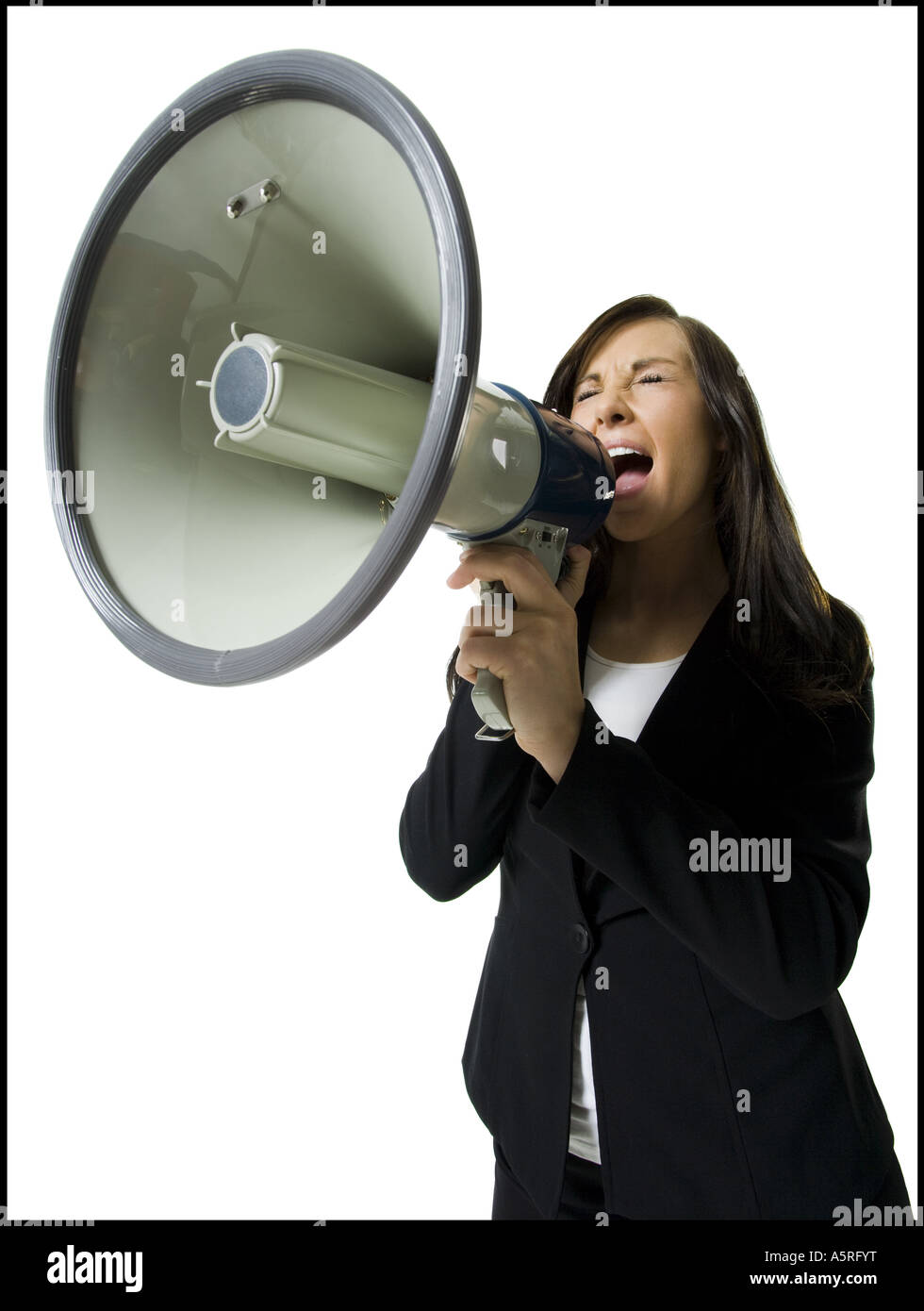 Close up of a teenage girl shouting into a megaphone Stock Photo - Alamy