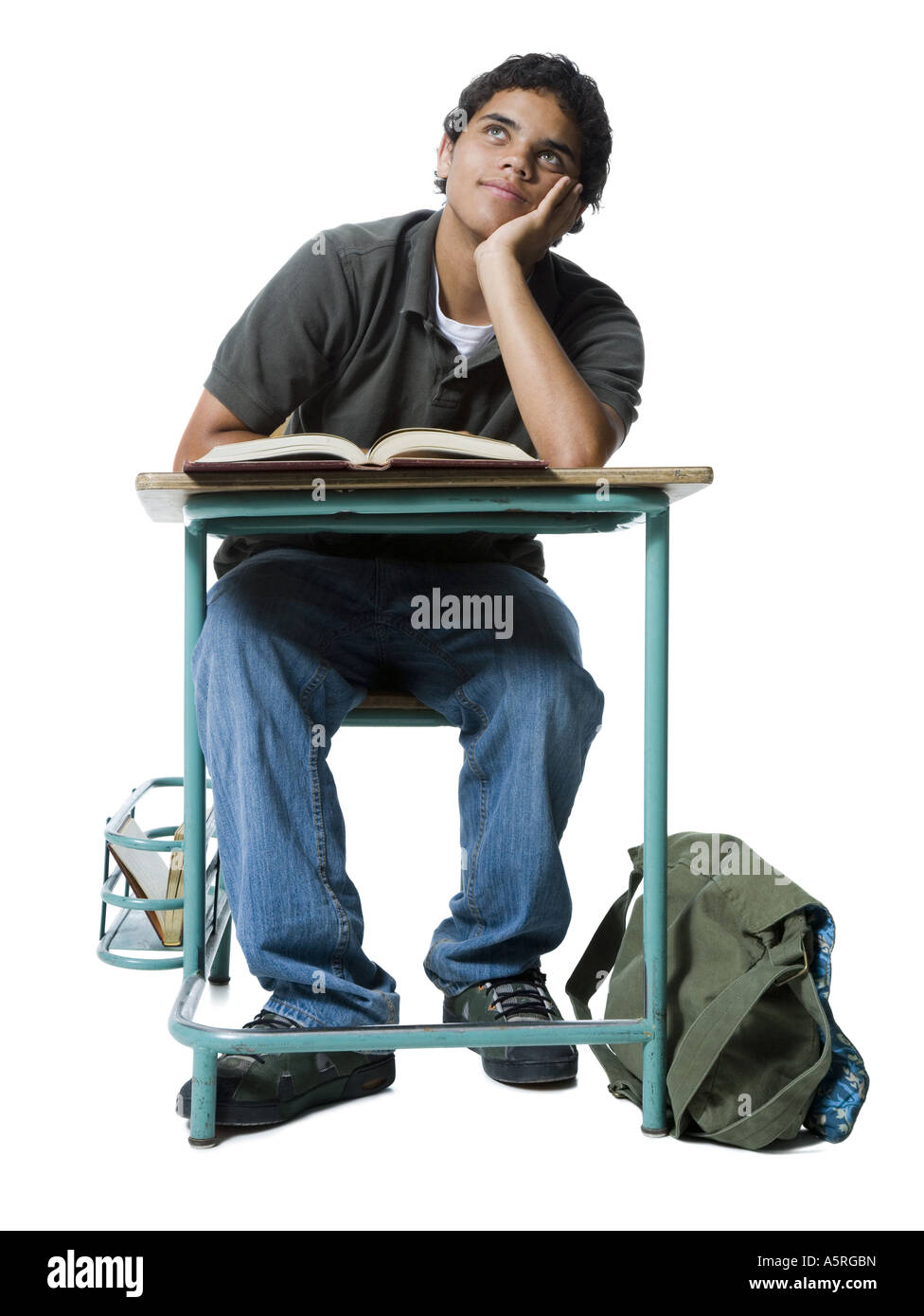 Teenage boy thinking with his hand on his chin Stock Photo - Alamy