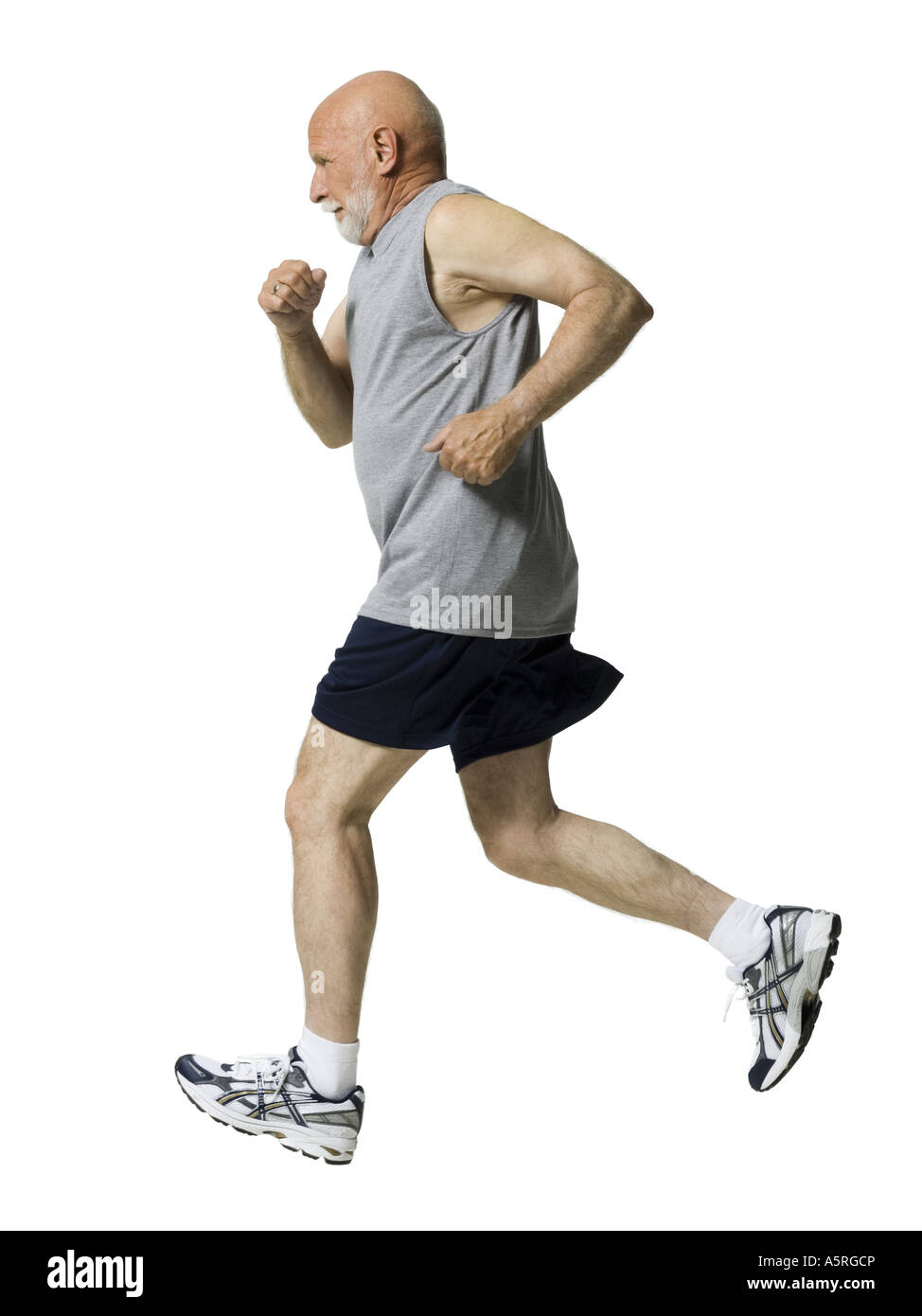 Profile of a senior man jogging Stock Photo - Alamy
