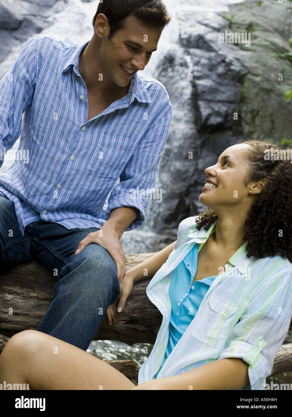 Close up of a young couple embracing each other Stock Photo - Alamy