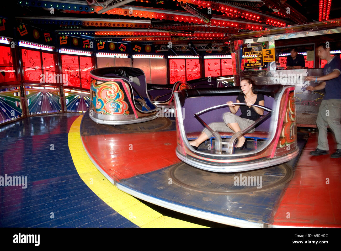 Girl on a carousel at the fun fair on South pier, Blackpool Stock Photo ...