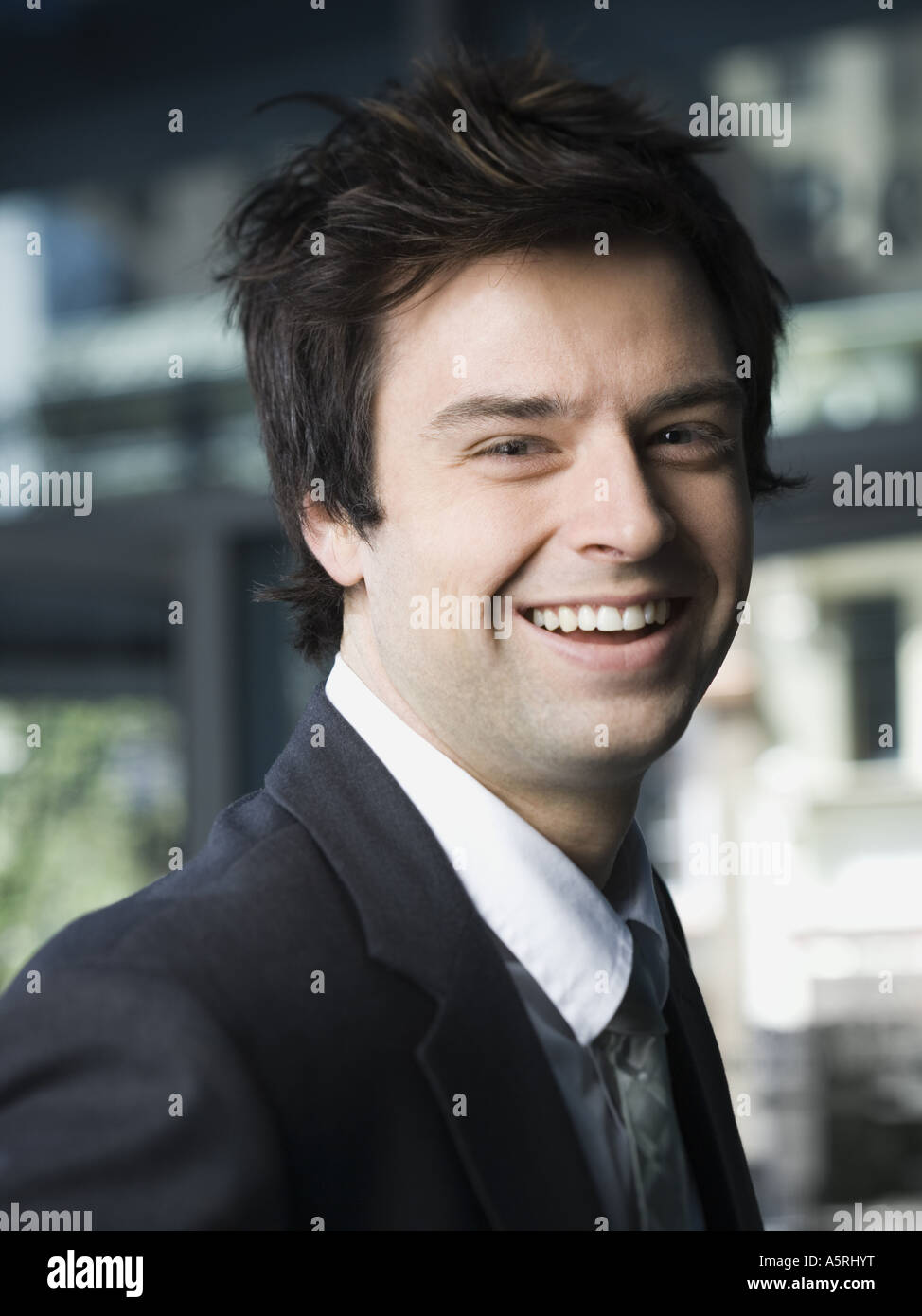 Portrait of a businessman smiling Stock Photo - Alamy
