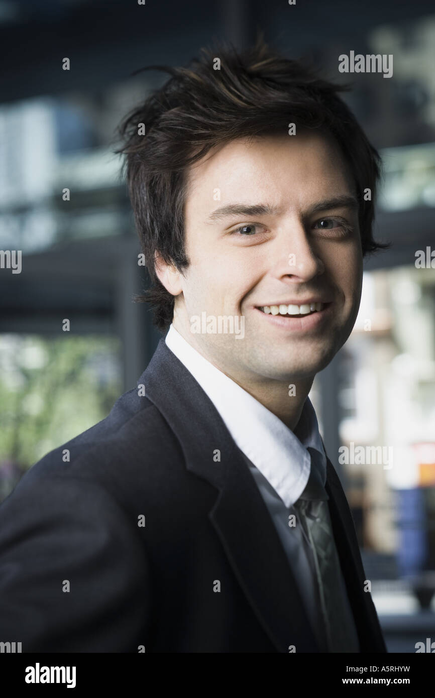 Portrait of a businessman smiling Stock Photo - Alamy