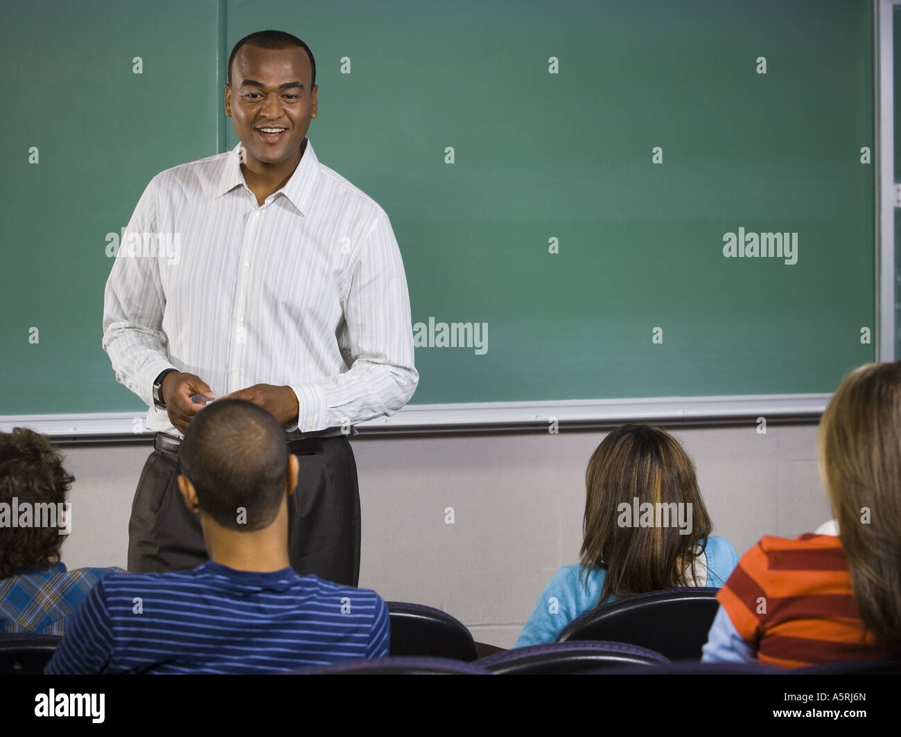 College teacher giving a lesson in classroom Stock Photo - Alamy