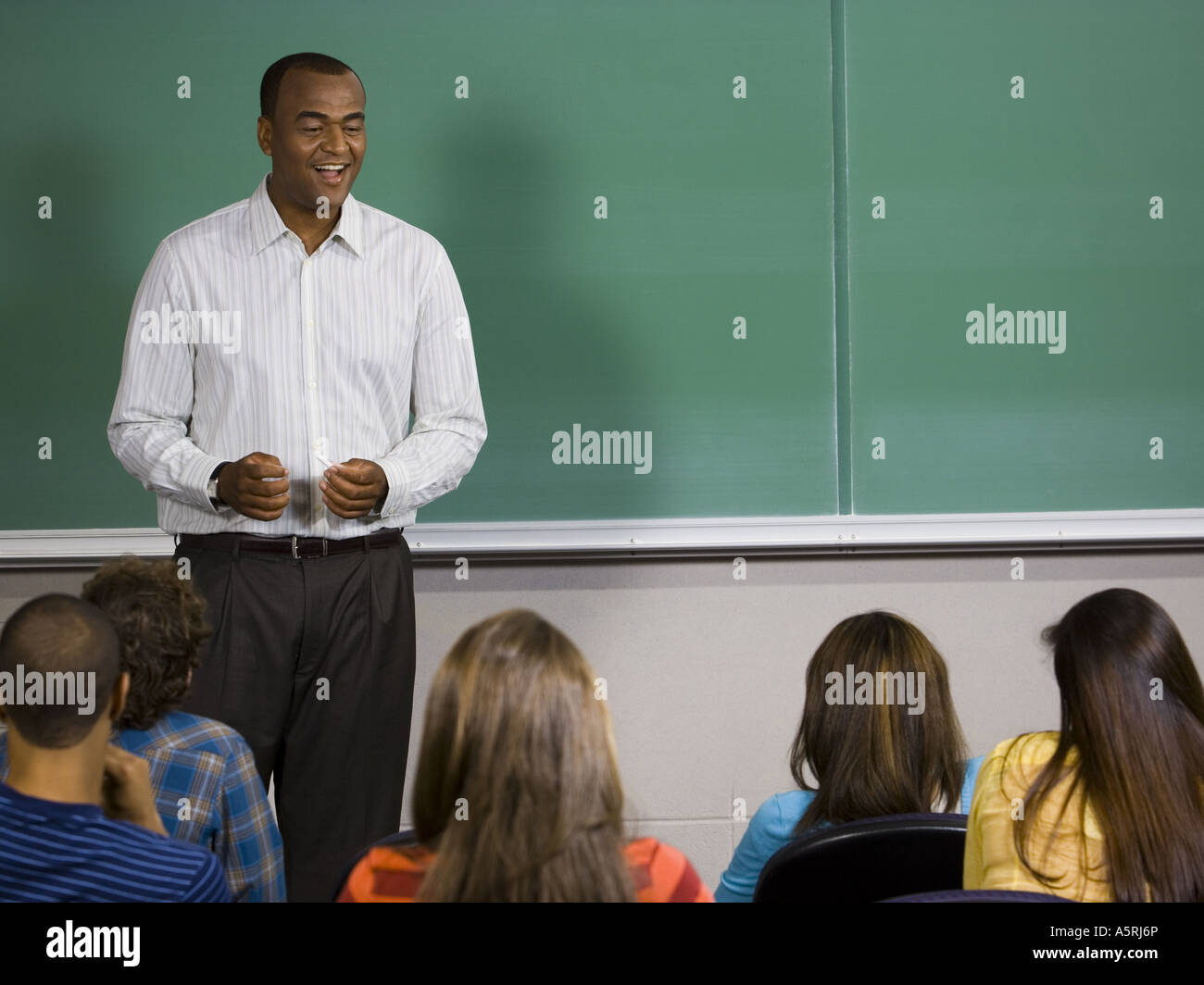 College teacher giving a lesson in classroom Stock Photo - Alamy