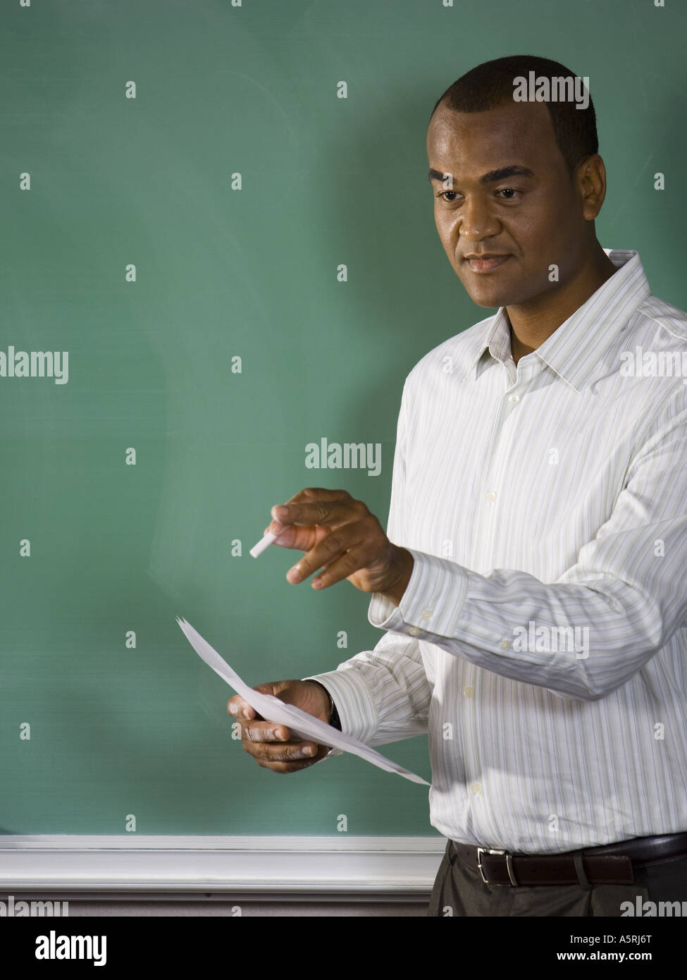 College teacher giving a lesson in classroom Stock Photo - Alamy
