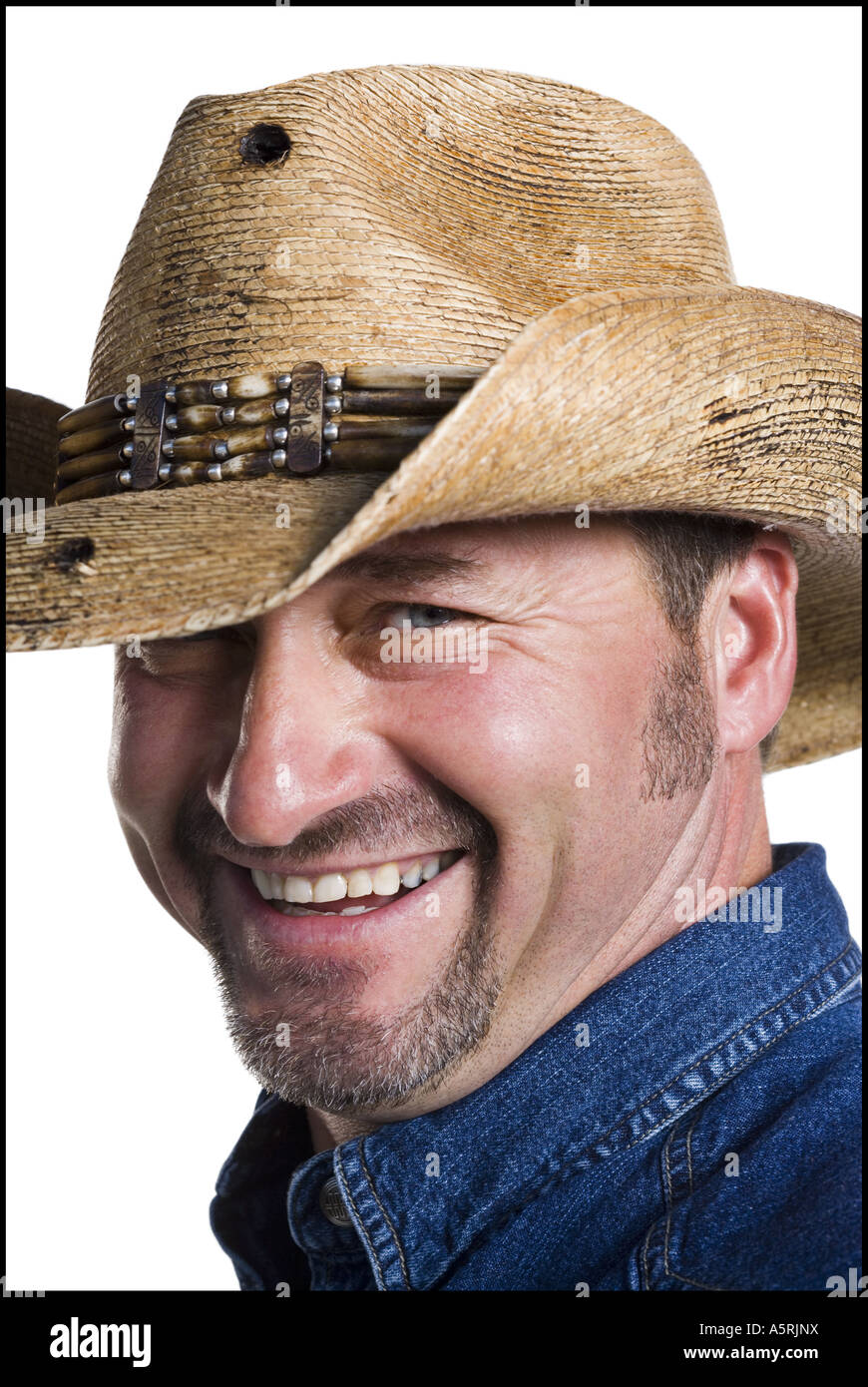 Smiling cowboy Stock Photo - Alamy