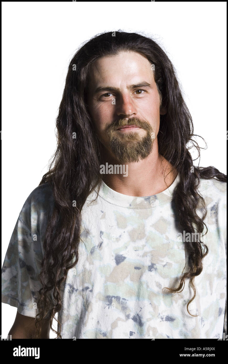 Man with long hair and a goatee Stock Photo - Alamy