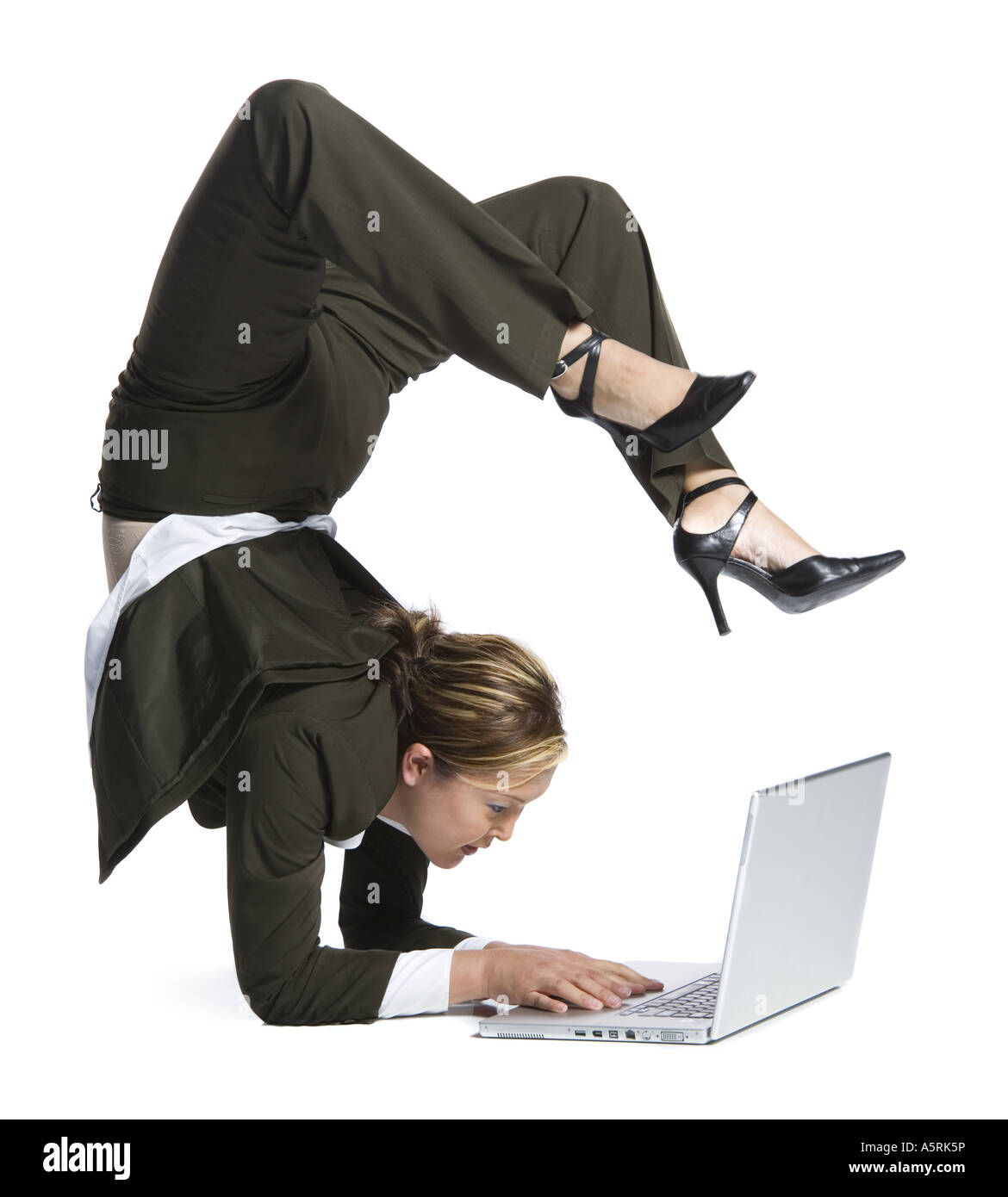 Female contortionist businesswoman Stock Photo - Alamy