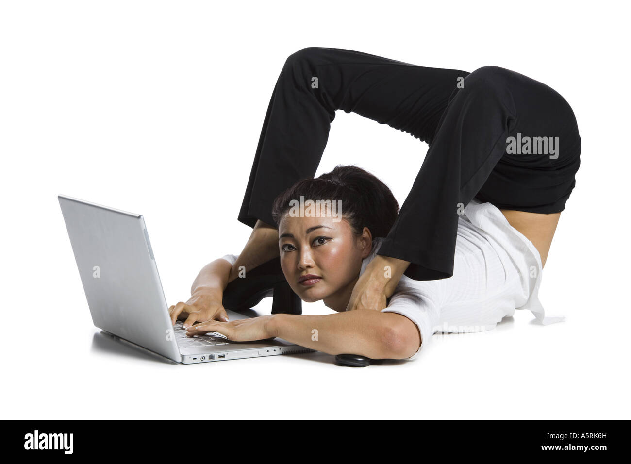 Female contortionist businesswoman Stock Photo - Alamy