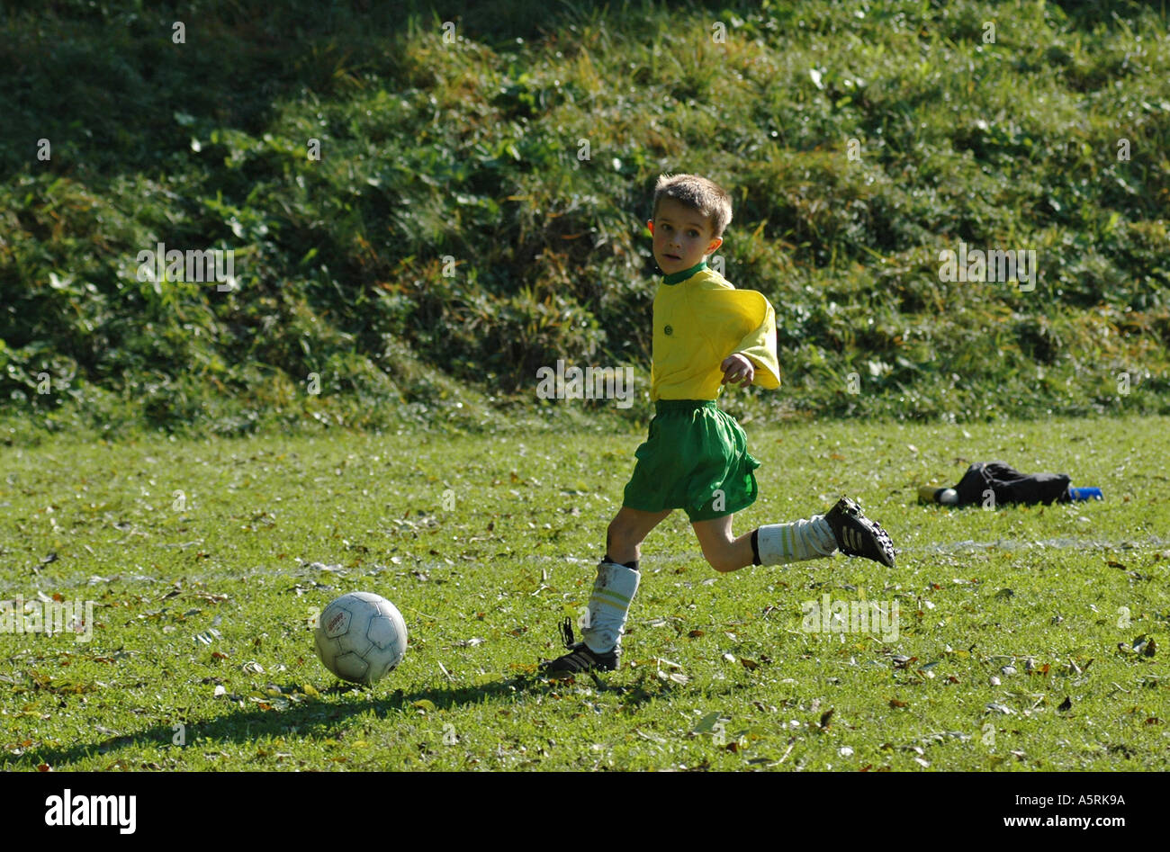 MR boy 6 years old is playing soccer ball Stock Photo - Alamy