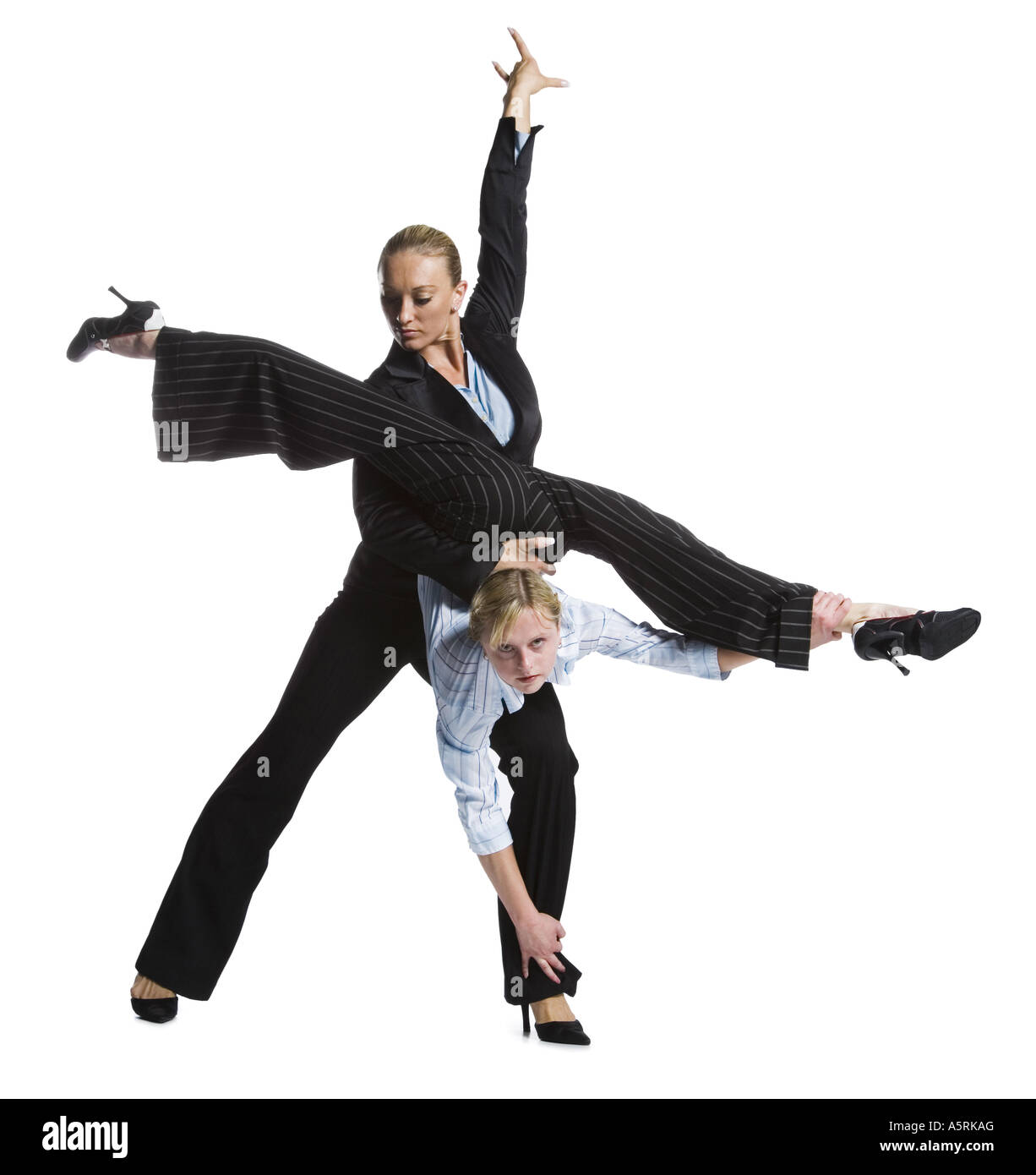 Two female contortionist businesswomen hi-res stock photography and ...