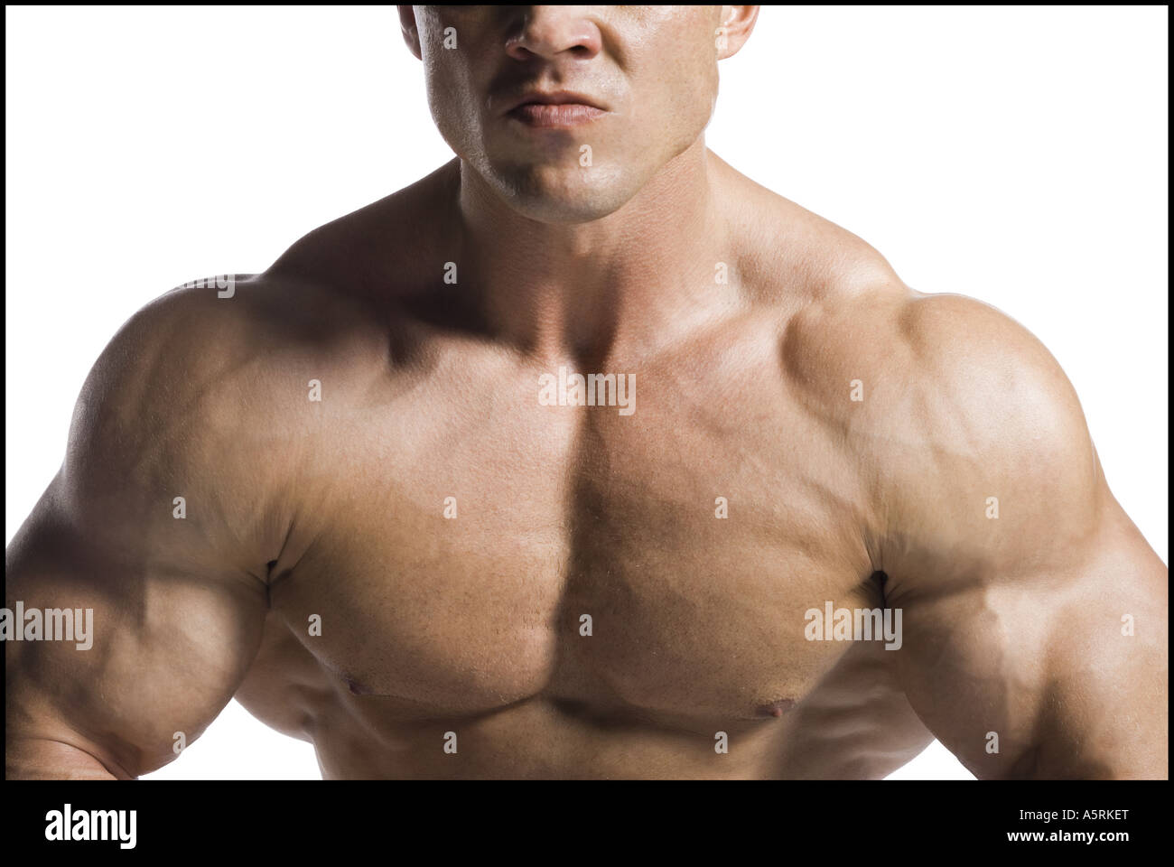 Male bodybuilder posing Stock Photo - Alamy