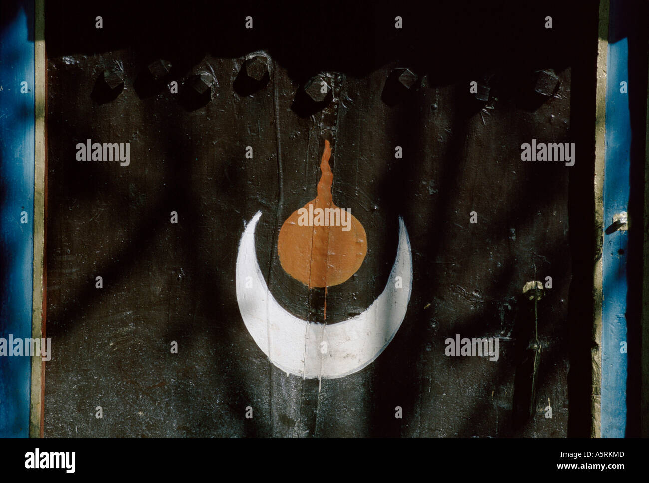 THE SUN MOON PAINTED ON TRADITIONAL TIBETAN HOUSES REPRESENTING THE ...