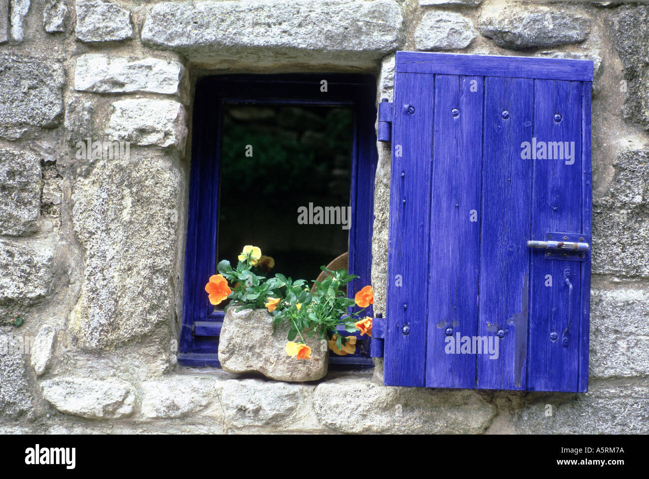 rustic window with blue shutter Stock Photo - Alamy