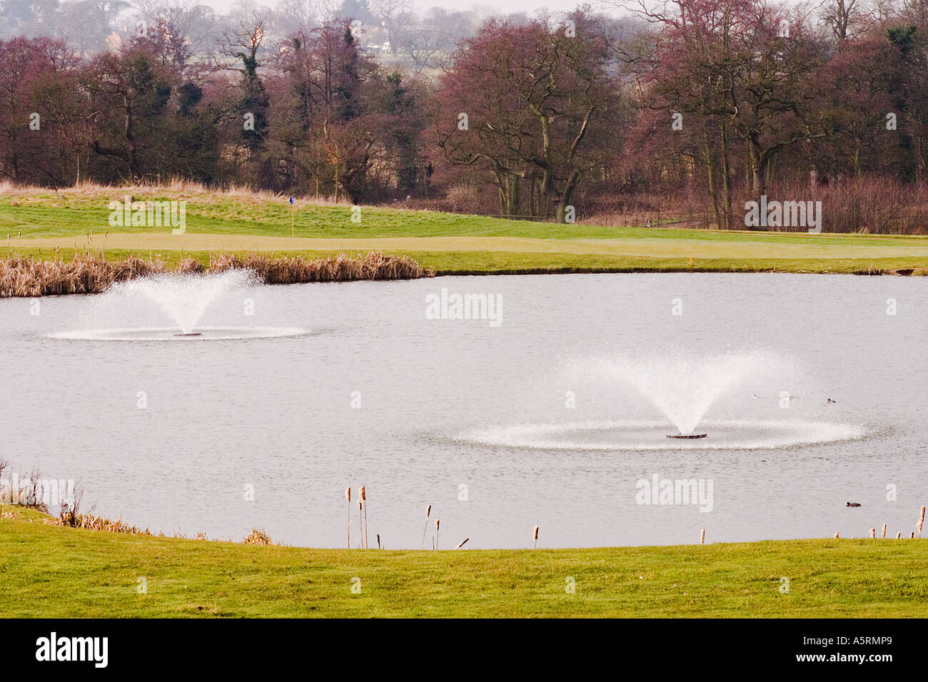 Circular fountains in a Circular fountains in a Cheshire golf course ...