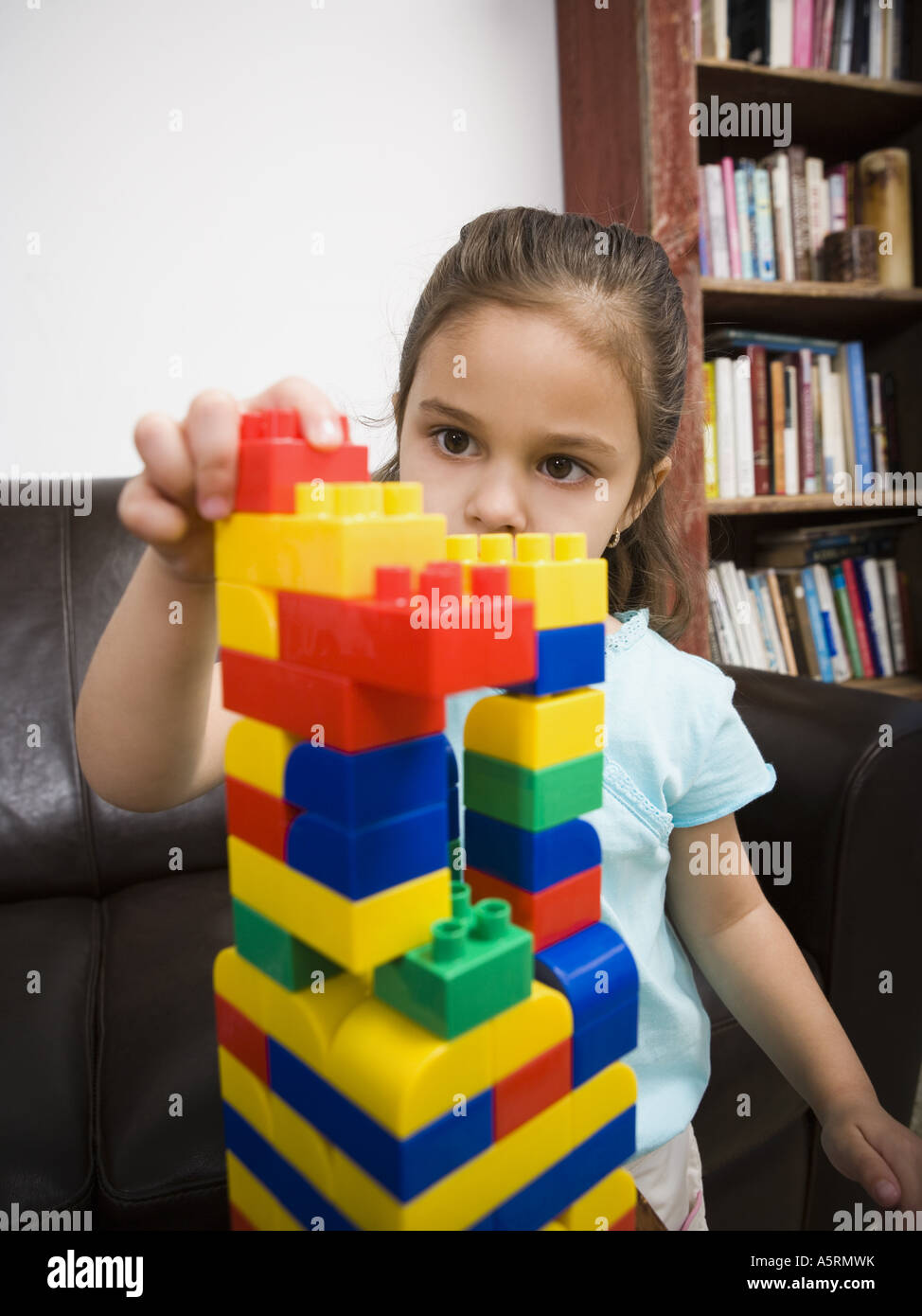 Mother and young daughter playing with building blocks Stock Photo - Alamy
