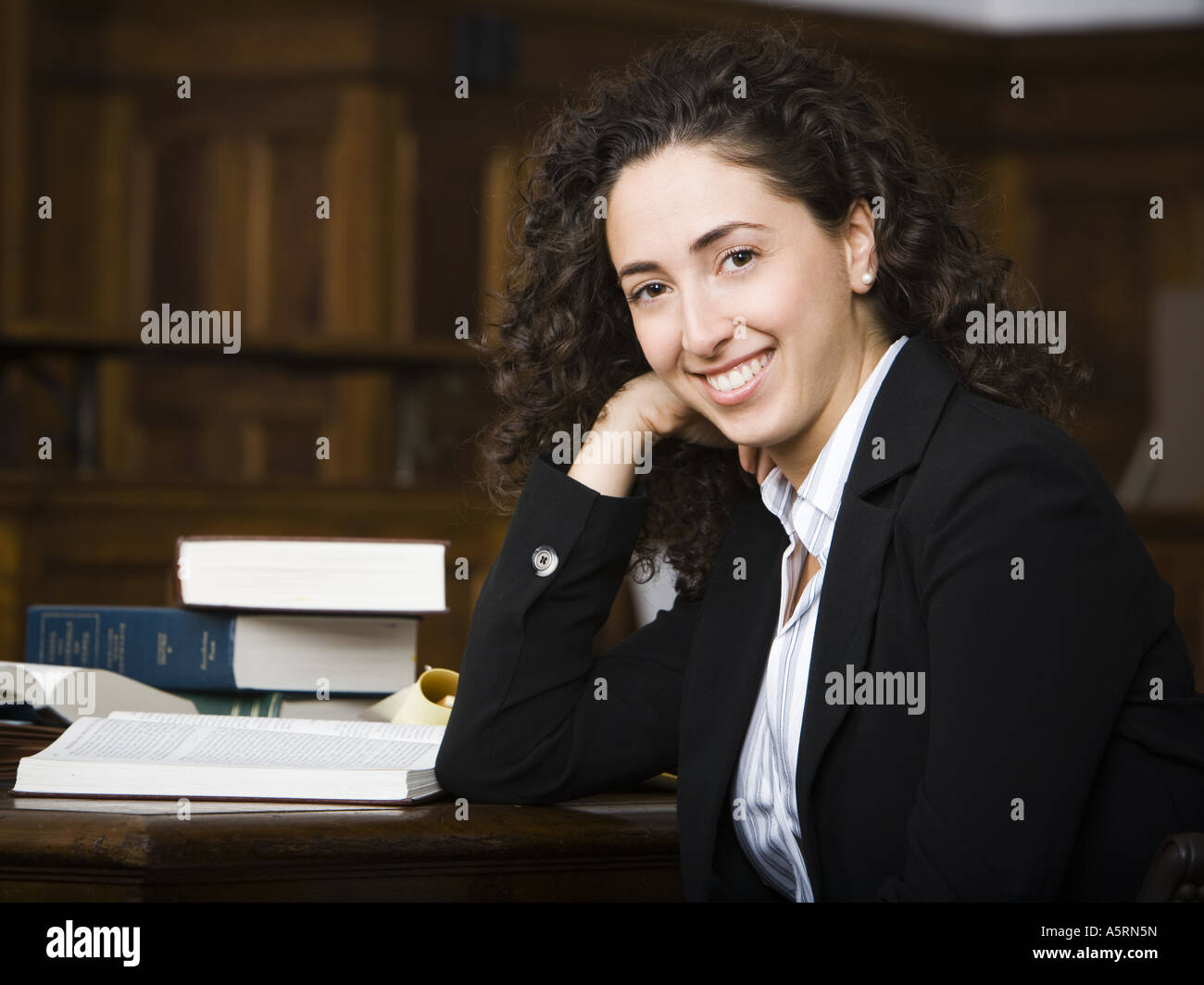 Female lawyer smiling in courtroom Stock Photo - Alamy