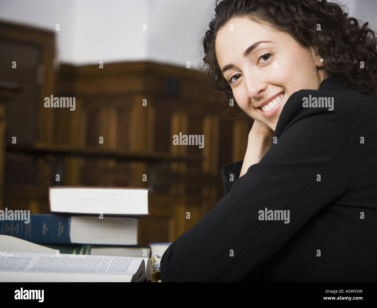 Female lawyer smiling in courtroom Stock Photo - Alamy