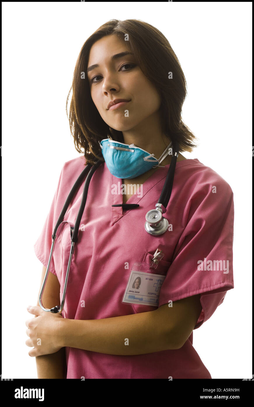 Female doctor in pink scrubs Stock Photo - Alamy