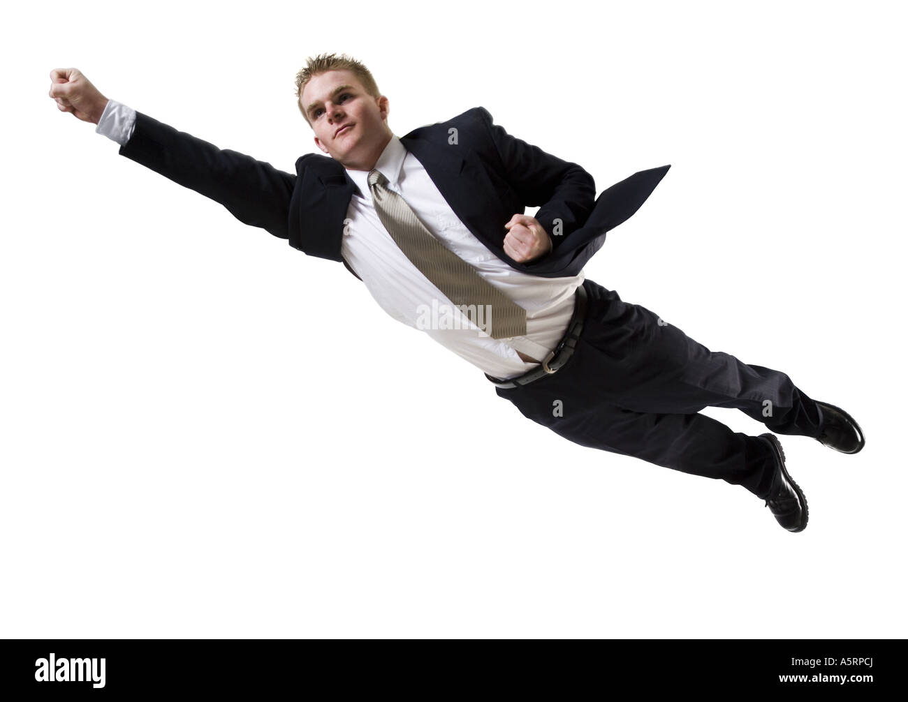 Businessman flying through the air Stock Photo - Alamy