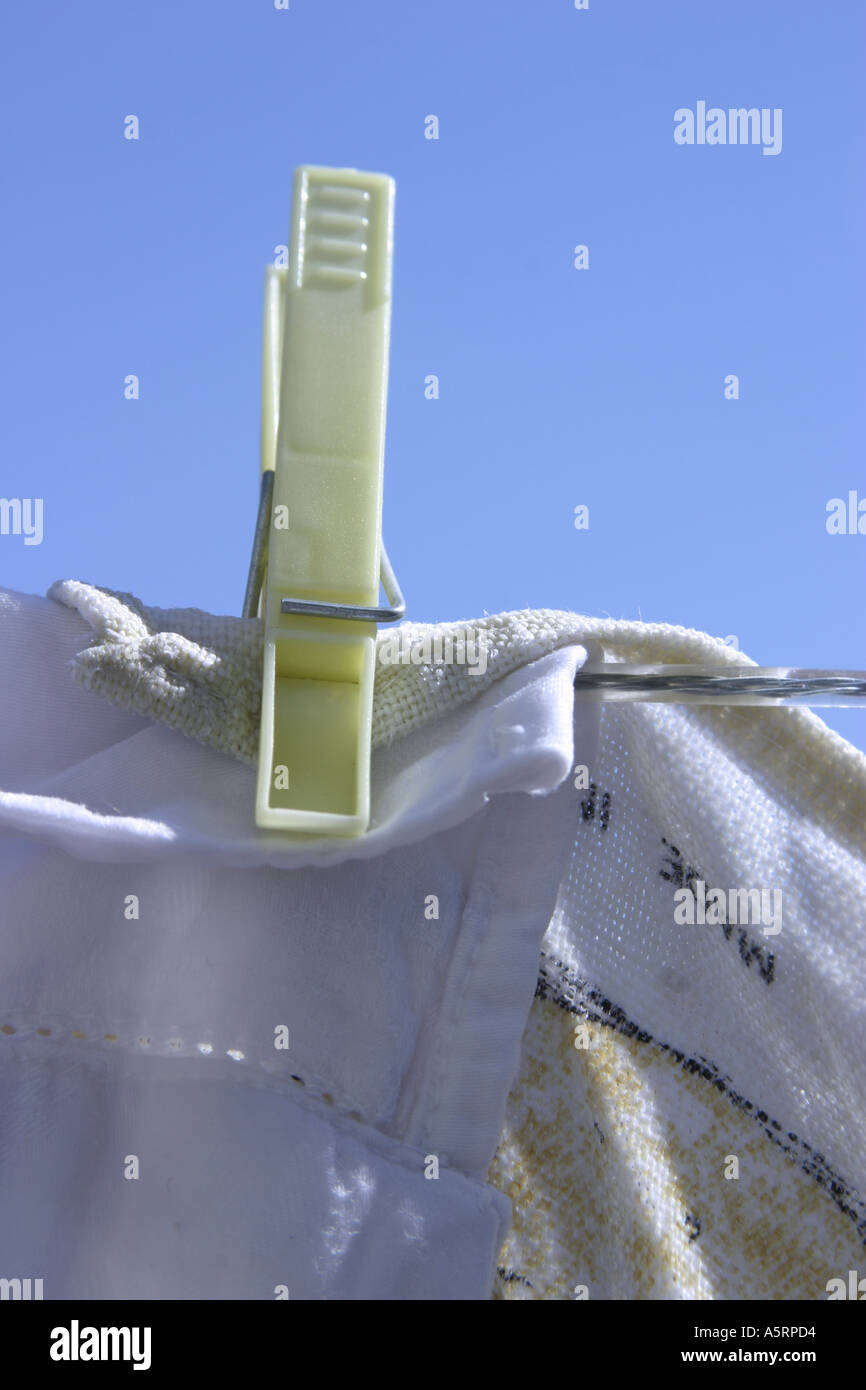 Peg on clothes line Stock Photo - Alamy