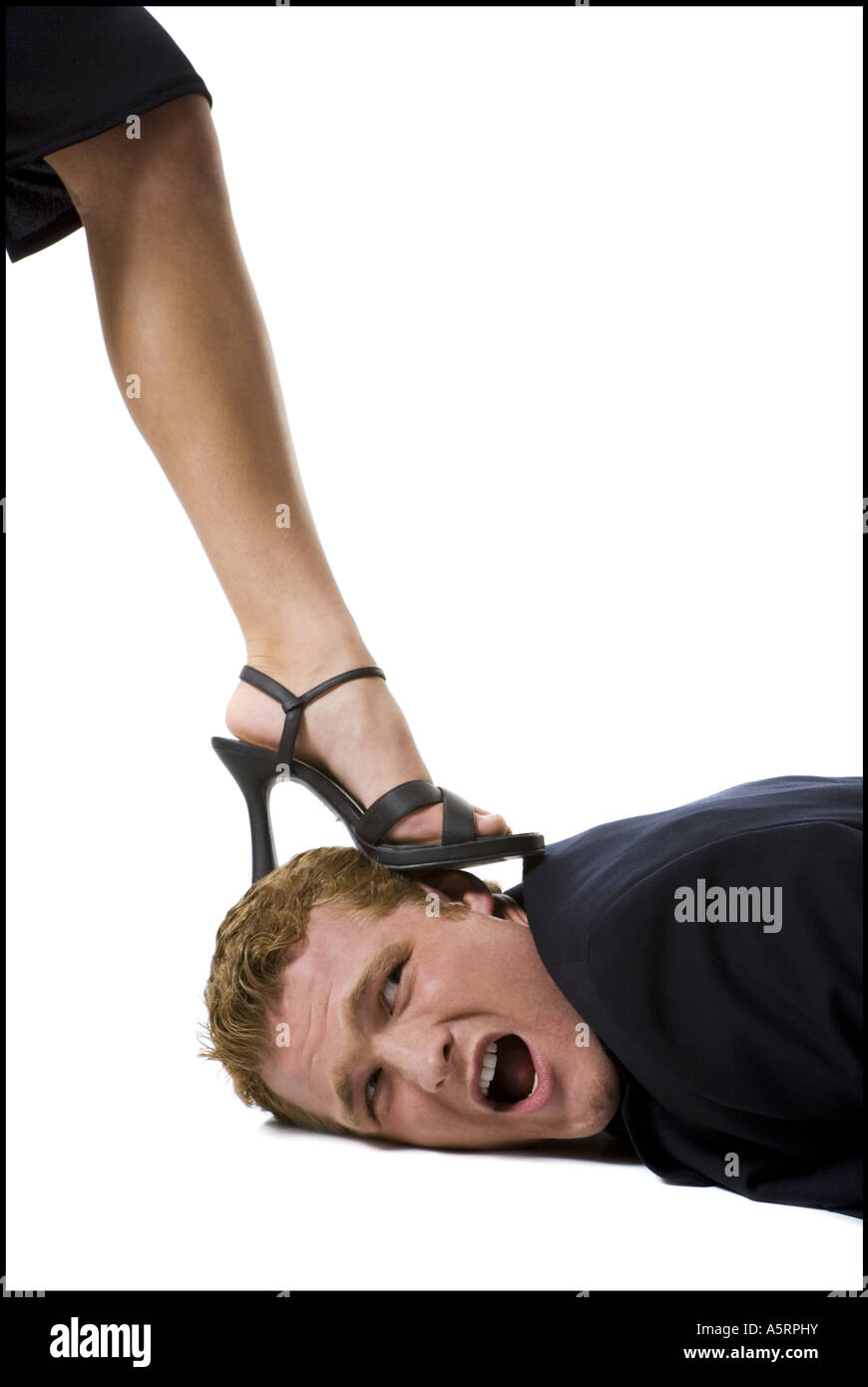 Woman stepping on man s head Stock Photo - Alamy