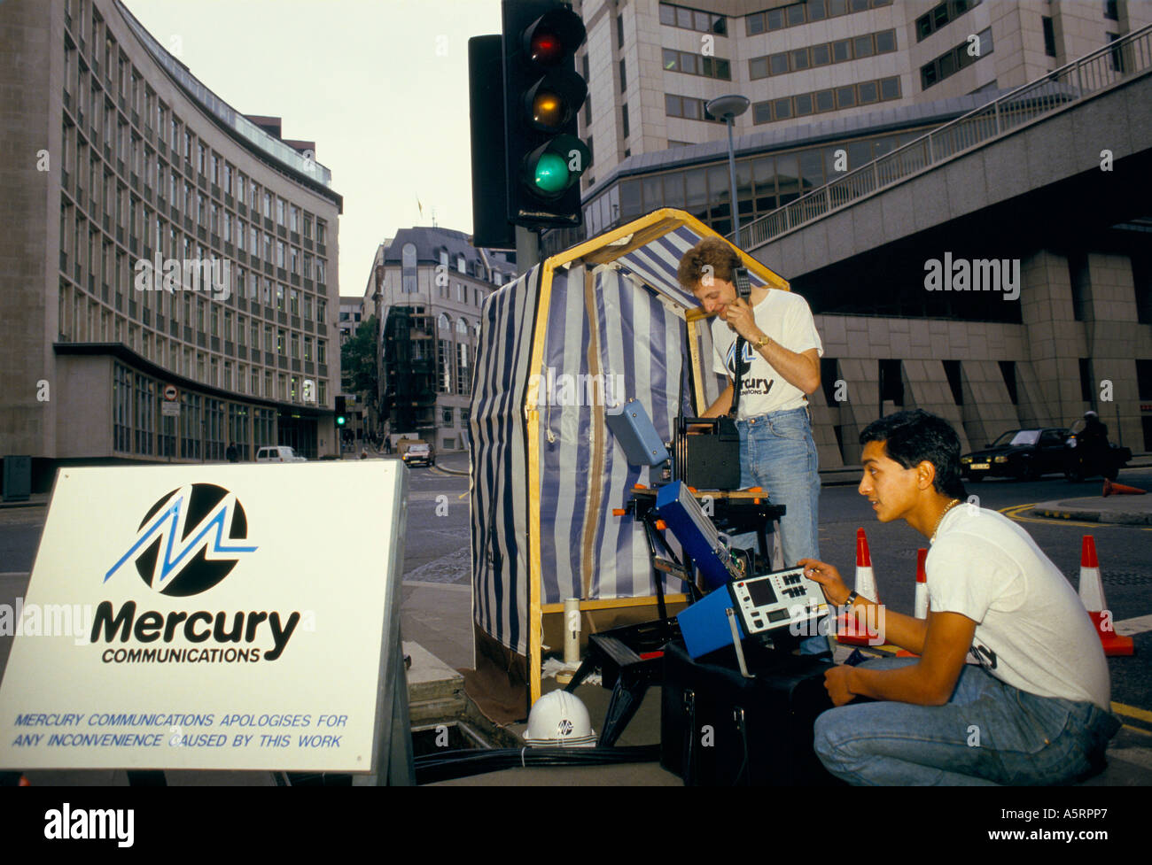 LAYING FIBRE OPTIC PHONE WIRES LONDON Stock Photo - Alamy