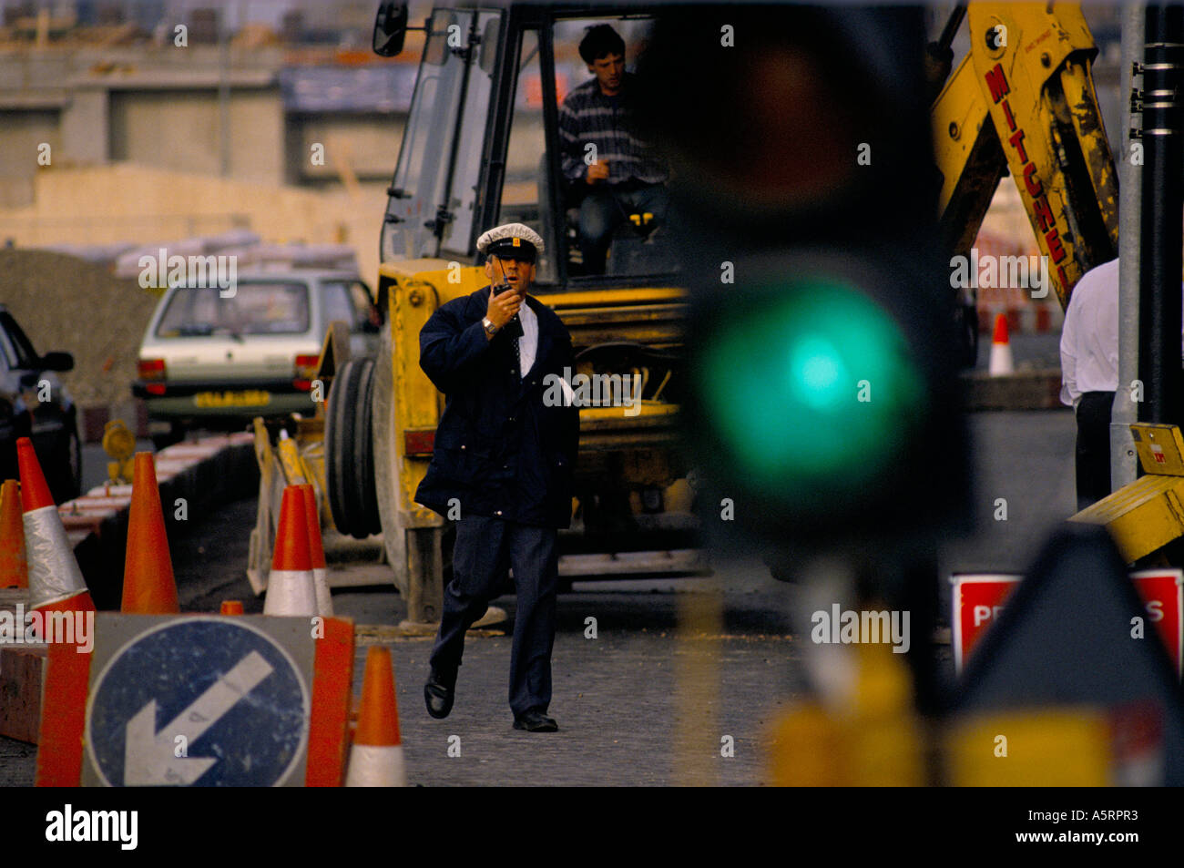 PRIVATE SECURITY FIRM DIRECTING TRAFFIC IN THE DOCKLANDS Stock Photo ...