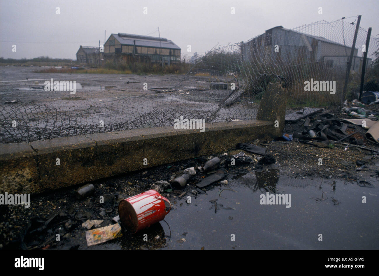DERELICT SITE OWNED BY BRITISH GAS BROKEN WIRE NETTING FENCE LITTERS ...