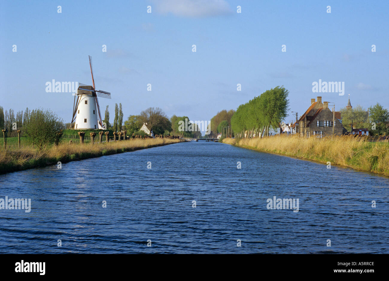 channel and windmill near Damme in Belgium Stock Photo - Alamy