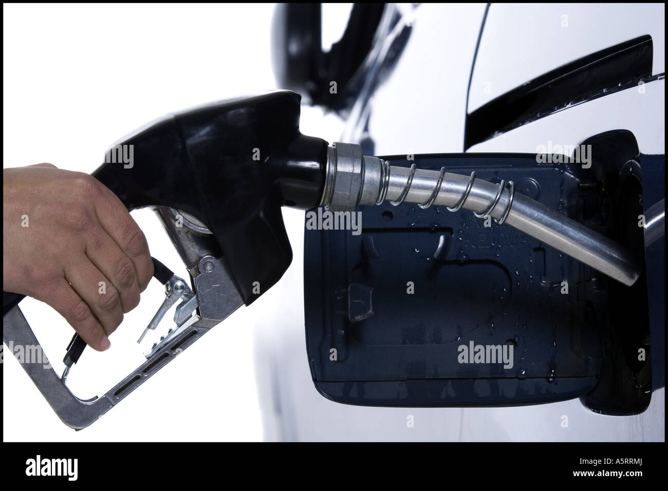 Filling up gas tank Stock Photo - Alamy