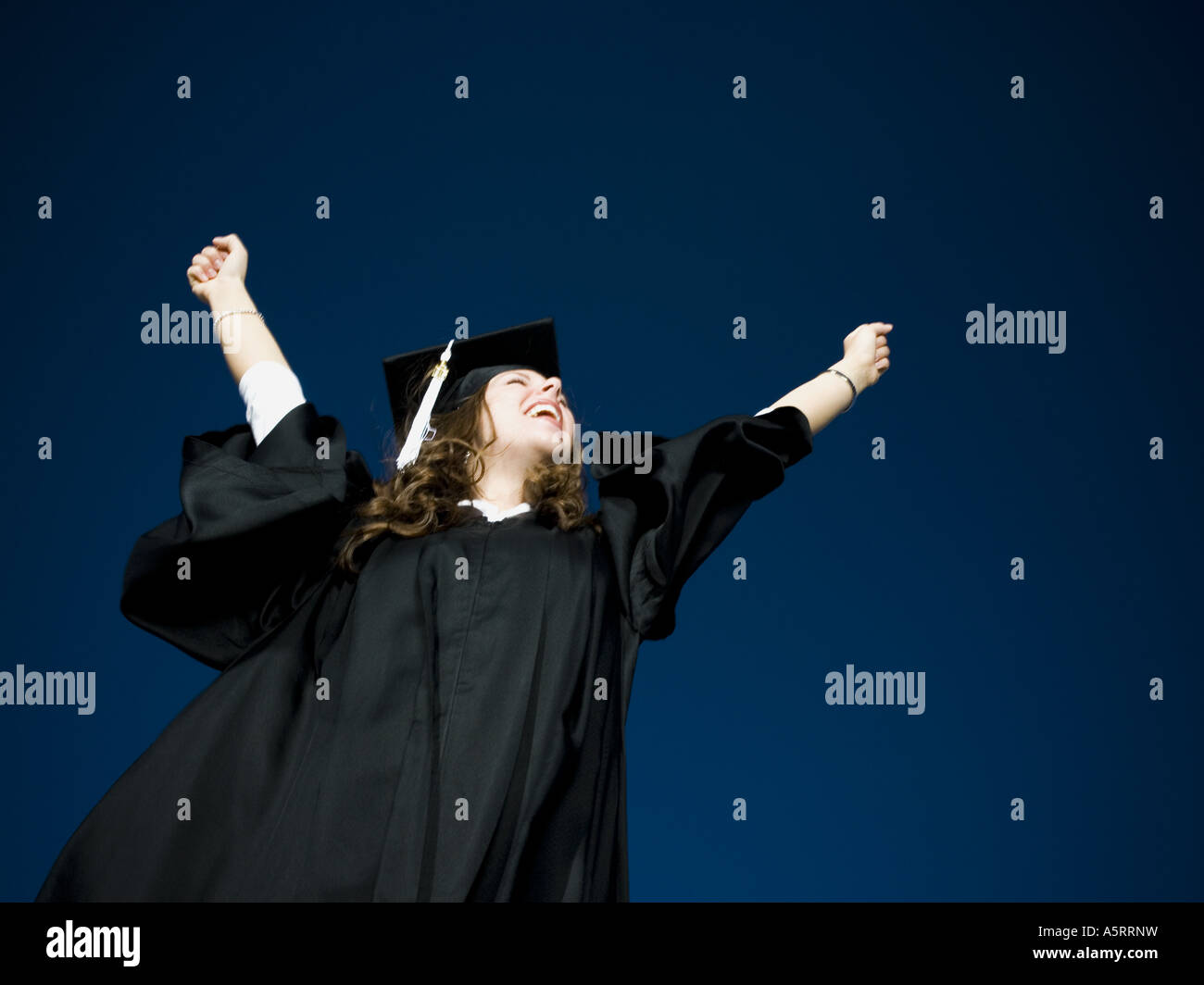 Female student celebrating graduation Stock Photo - Alamy
